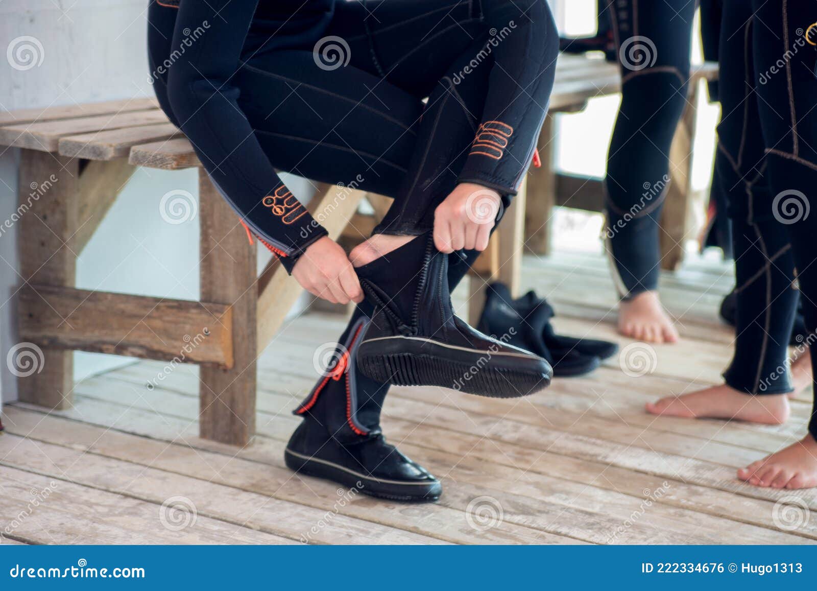 The Diver Puts on the Equipment. Diving Shoes. Close-up Stock Photo ...