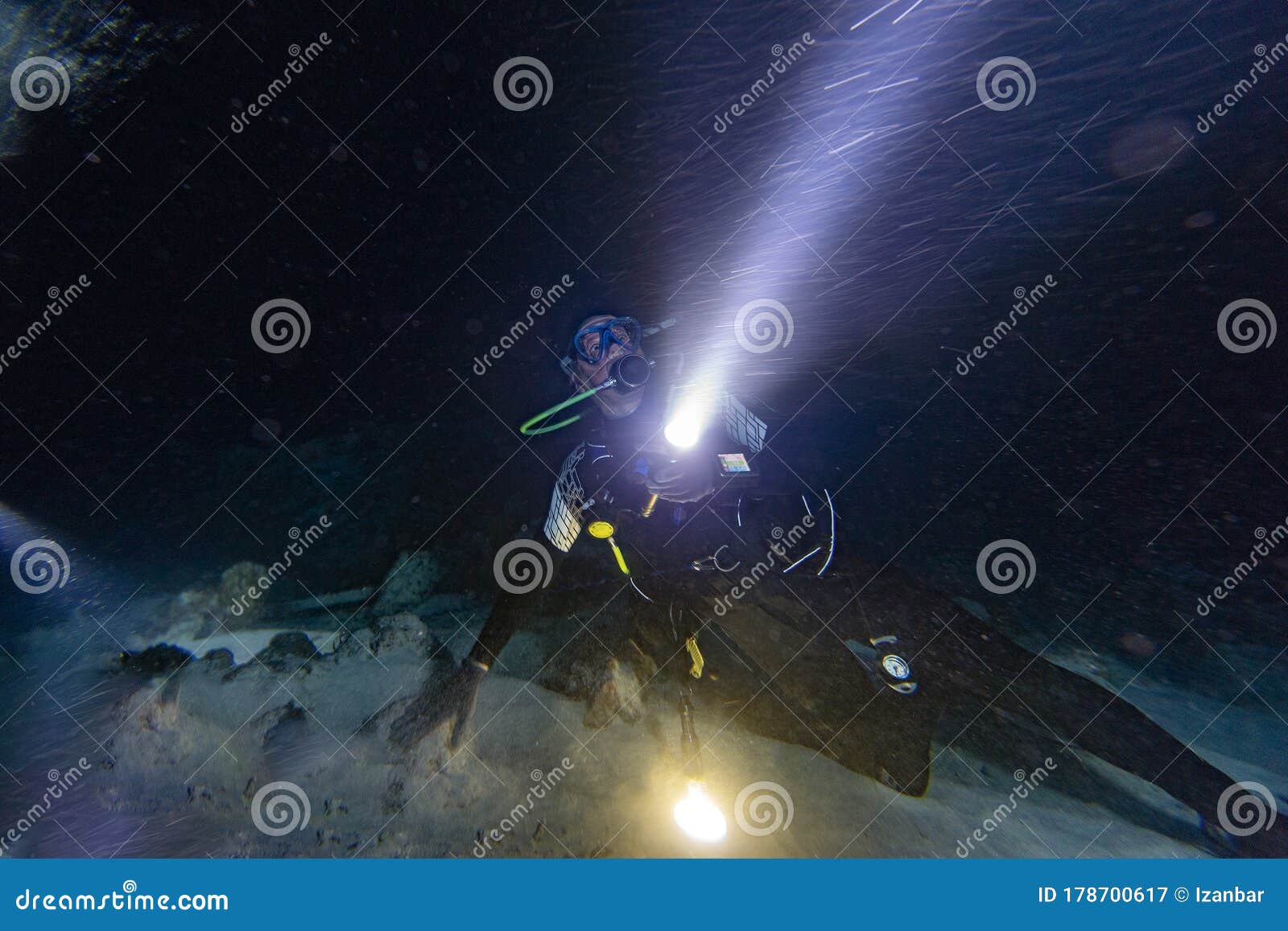 Diver in Strong Current at Night with Torch Stock Image - Image of ...