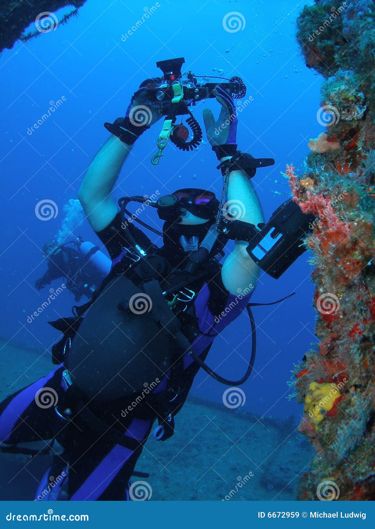 Diver taking pictures stock image. Image of colourful - 6672959