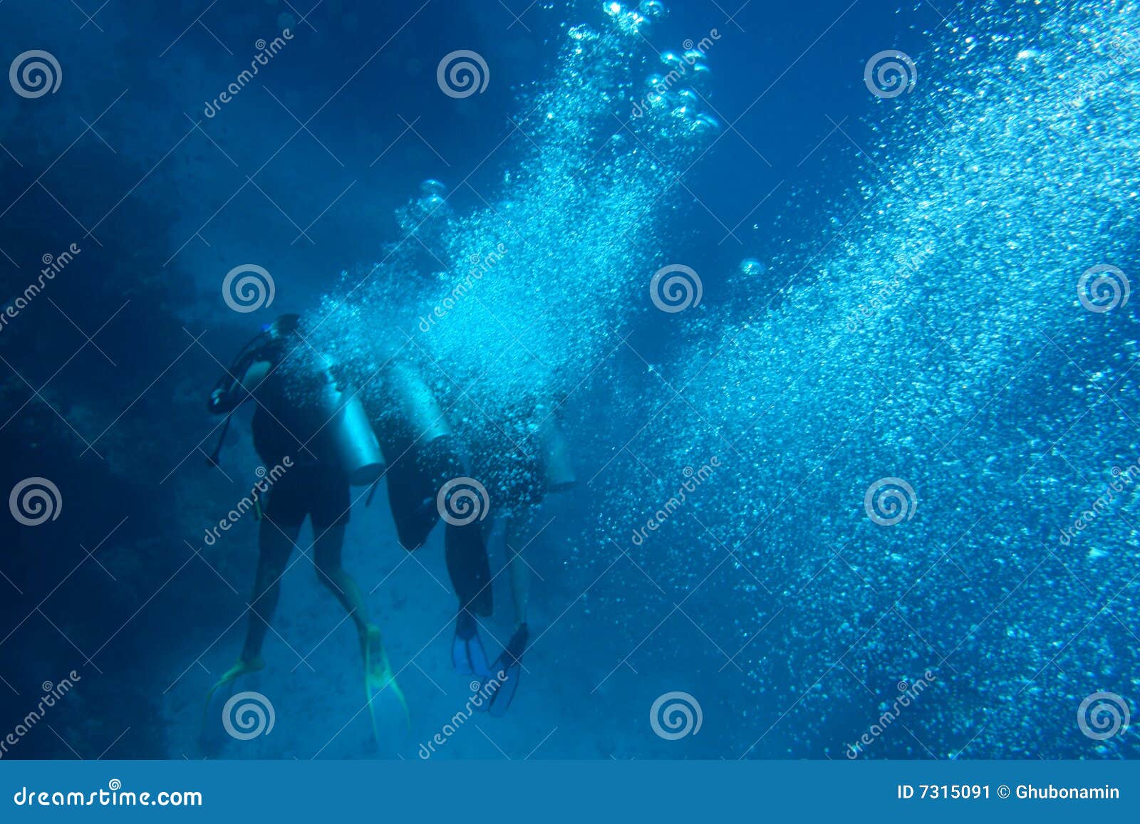 Divers stock image. Image of silhouette, people, depth - 7315091