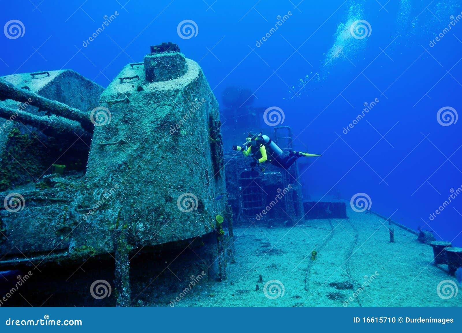Divers Exploring a Shipwreck Stock Photo - Image of divers, exploration ...