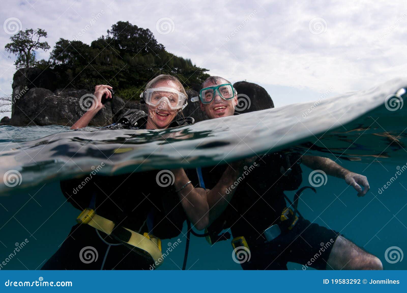 Divers scuba dive together stock photo. Image of active - 19583292