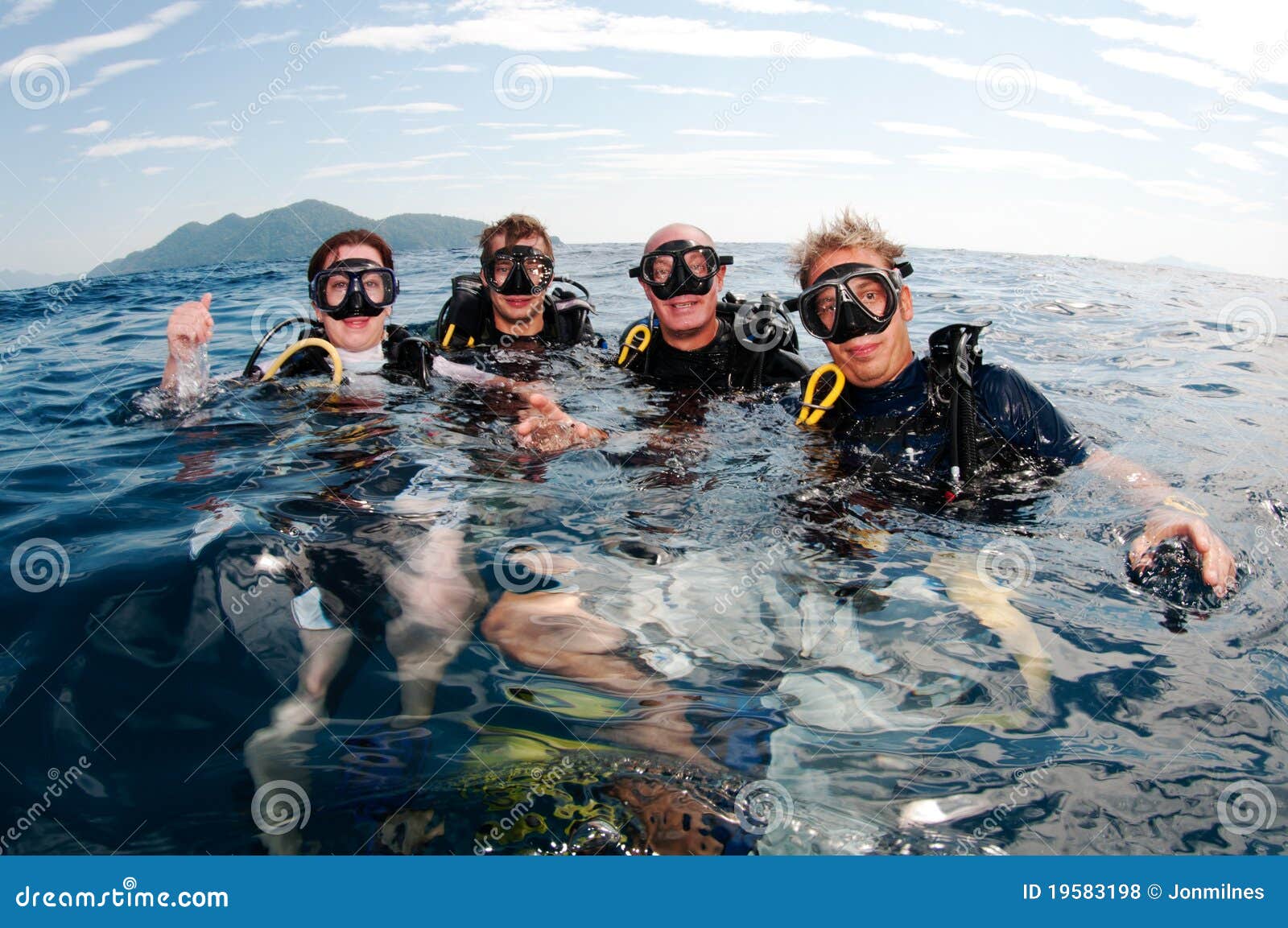 Divers Scuba Dive Together on Surface Stock Photo - Image of dive ...