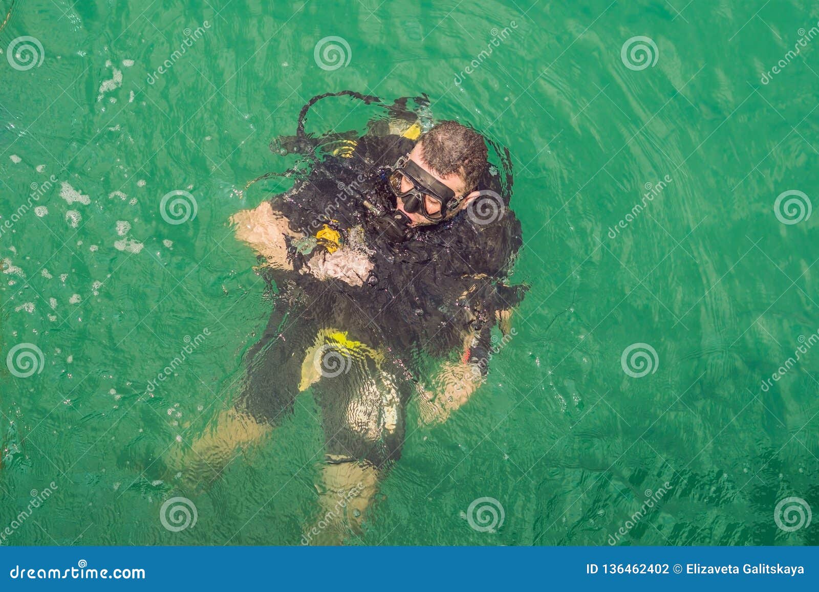 Divers on the Surface of Water Ready To Dive Stock Photo - Image of ...