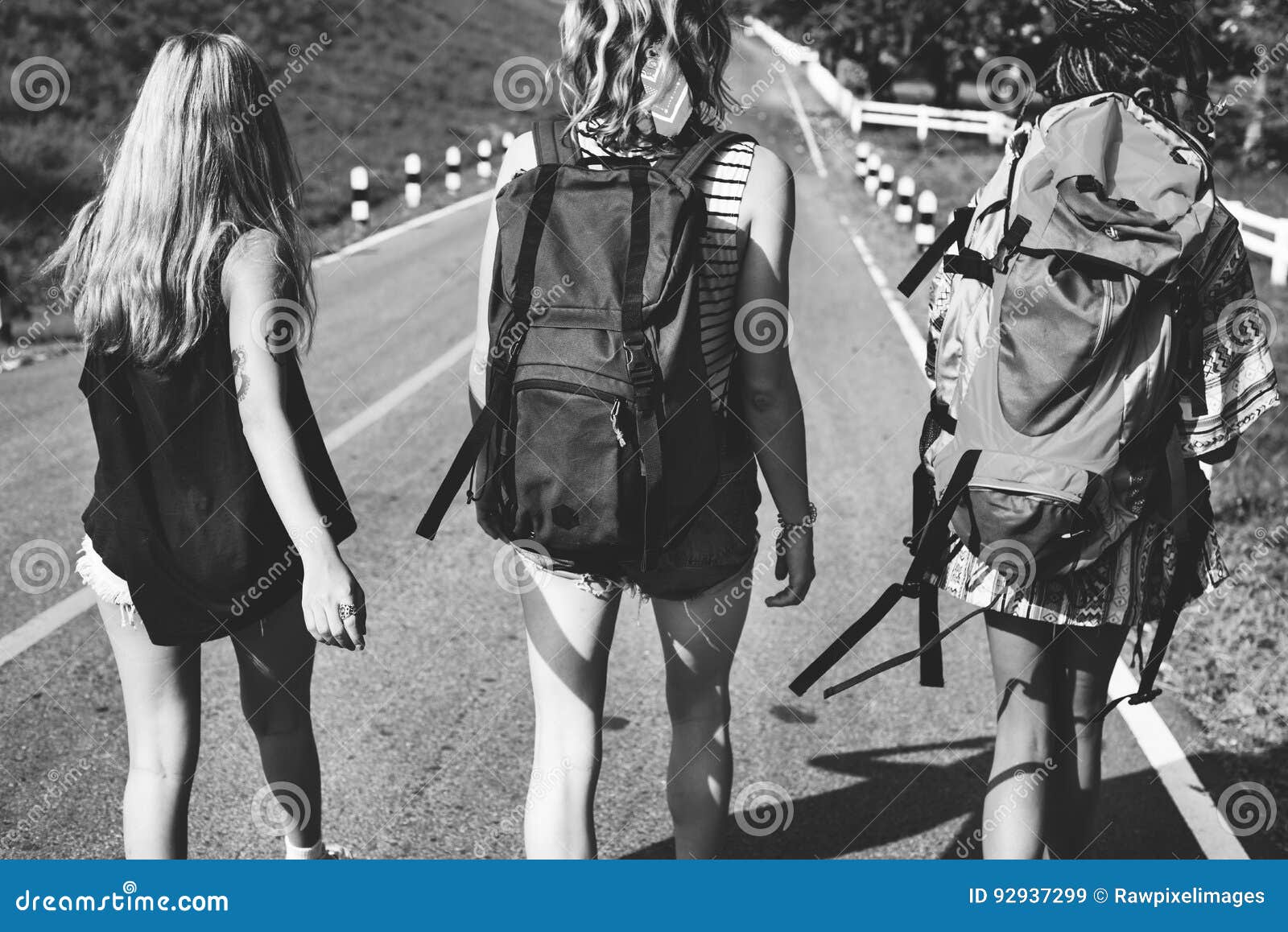 Diverse Backpacker Women Walking Along the Street Side Stock Image ...