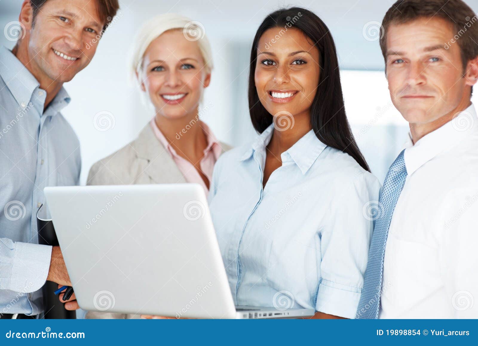 Diverse Business Group Smiling with a Laptop Stock Photo - Image of ...