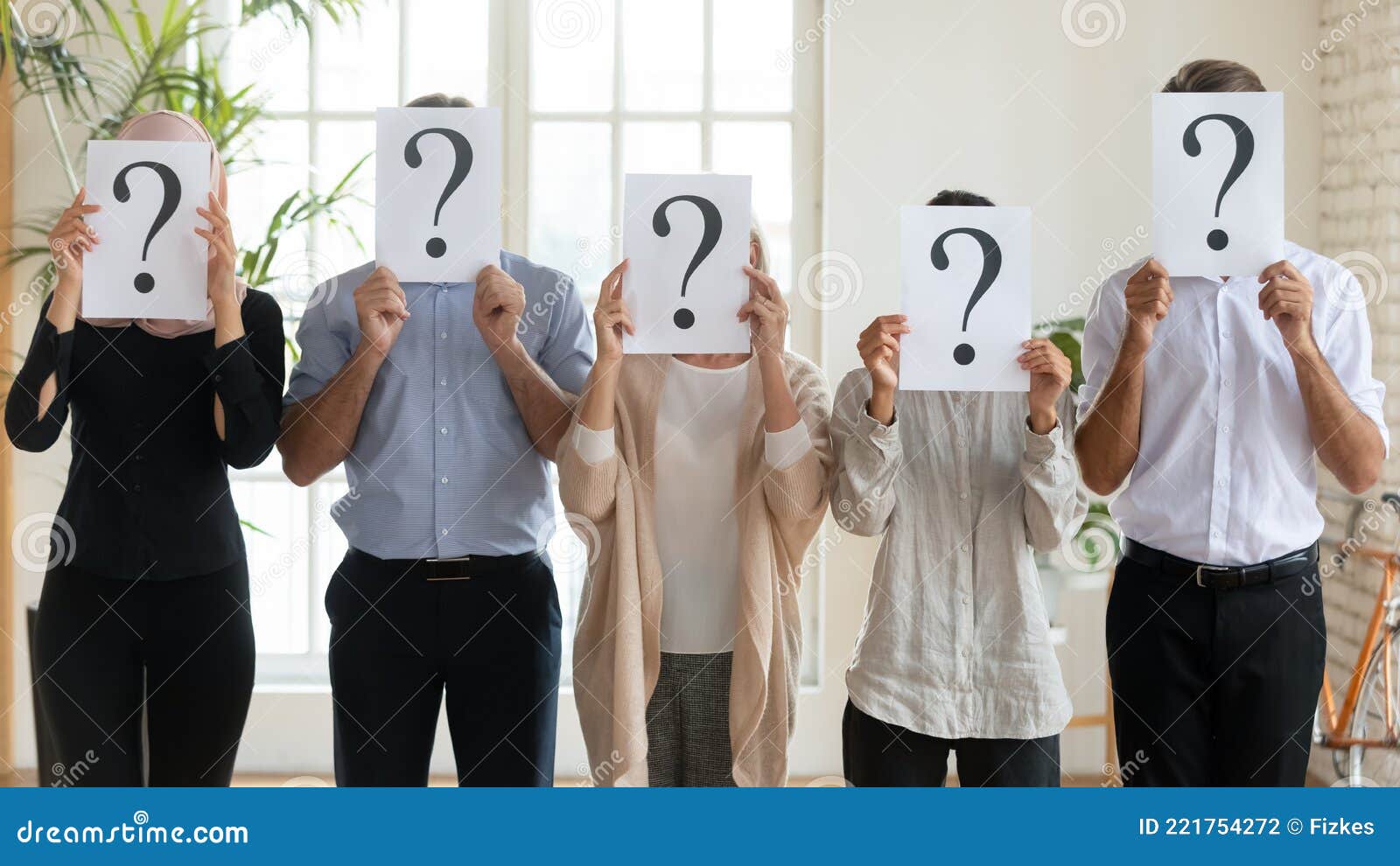 Diverse Business People Hiding Faces Behind Papers with Question Marks ...