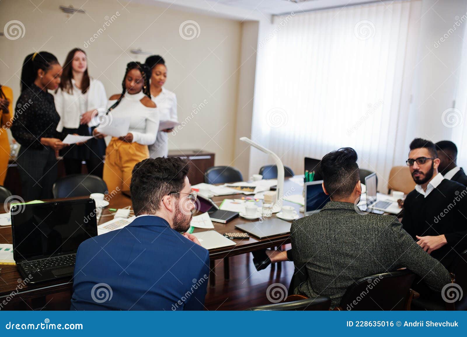 Diverse Business People on a Meeting at Round Table Stock Photo - Image ...