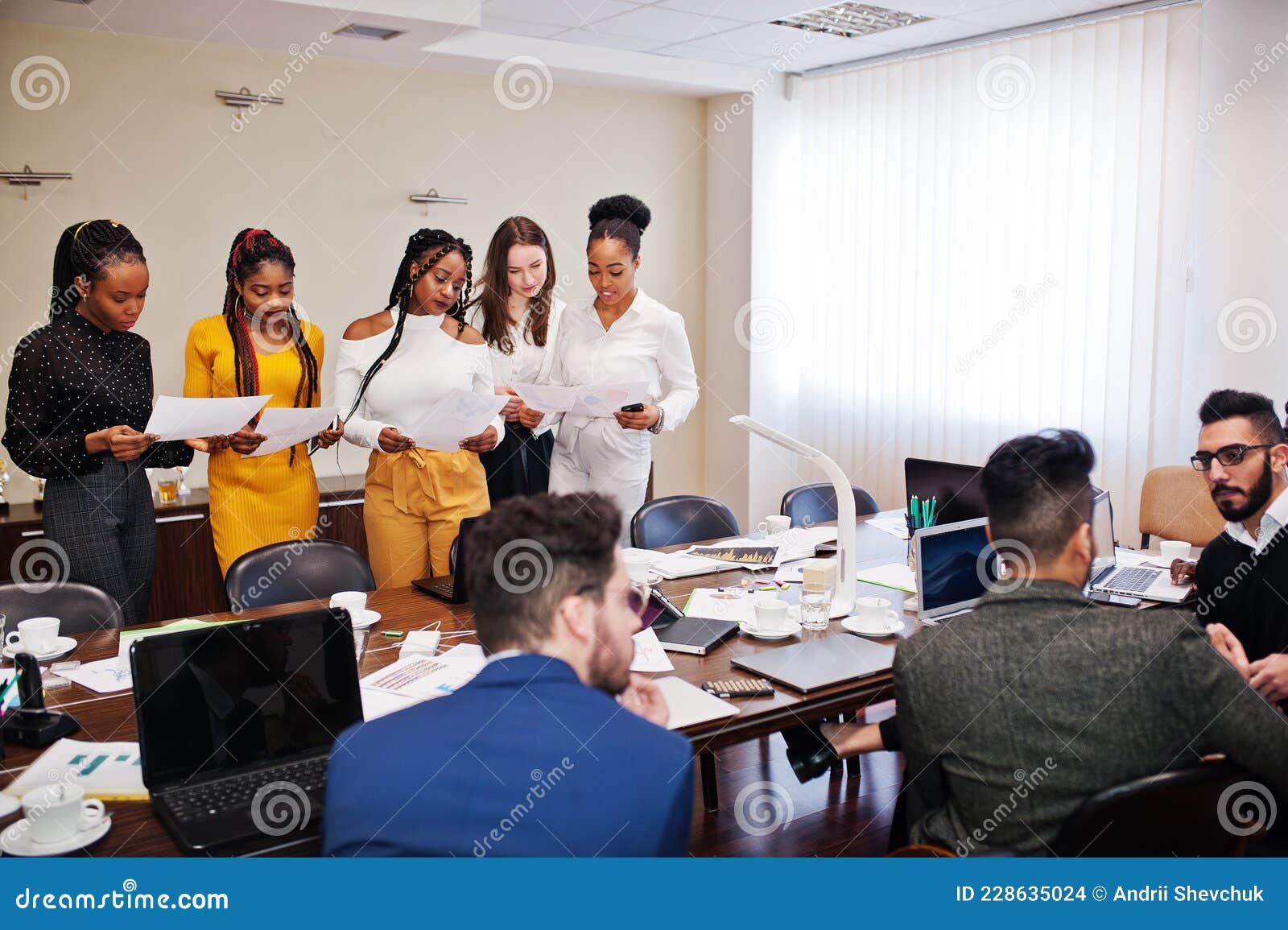 Diverse Business People on a Meeting at Round Table Stock Photo - Image ...