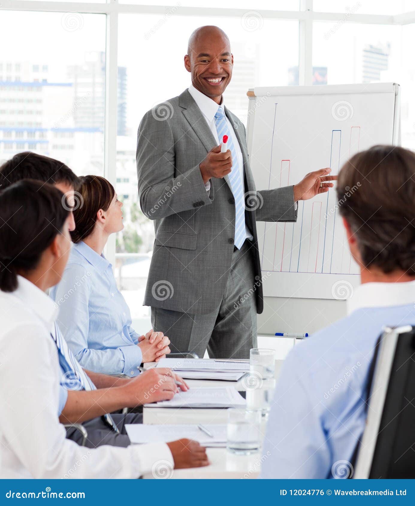 Diverse Business People Studying a Business Plan Stock Photo - Image of ...