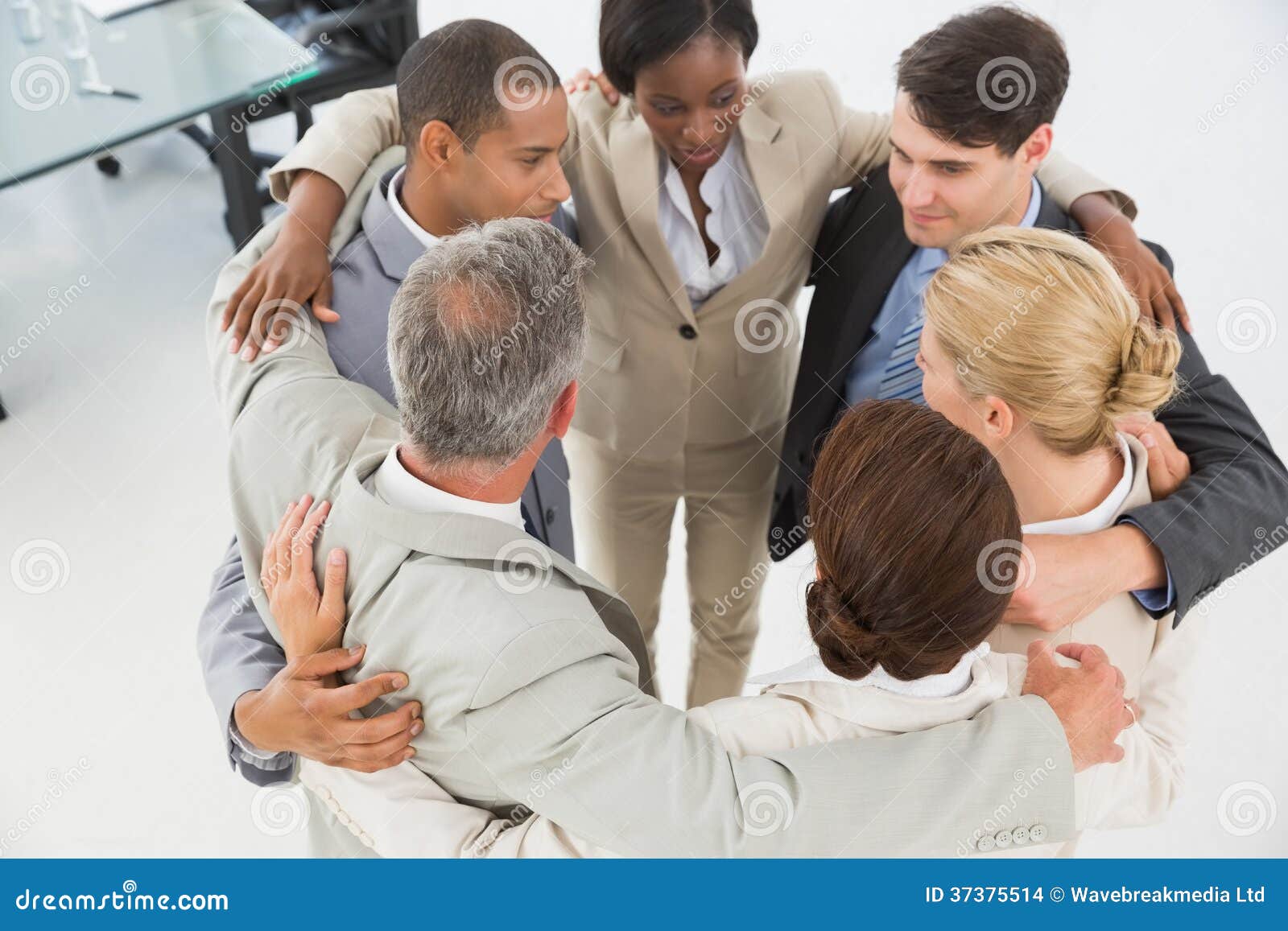 Diverse Business Team Hugging in a Circle Stock Photo - Image of ...