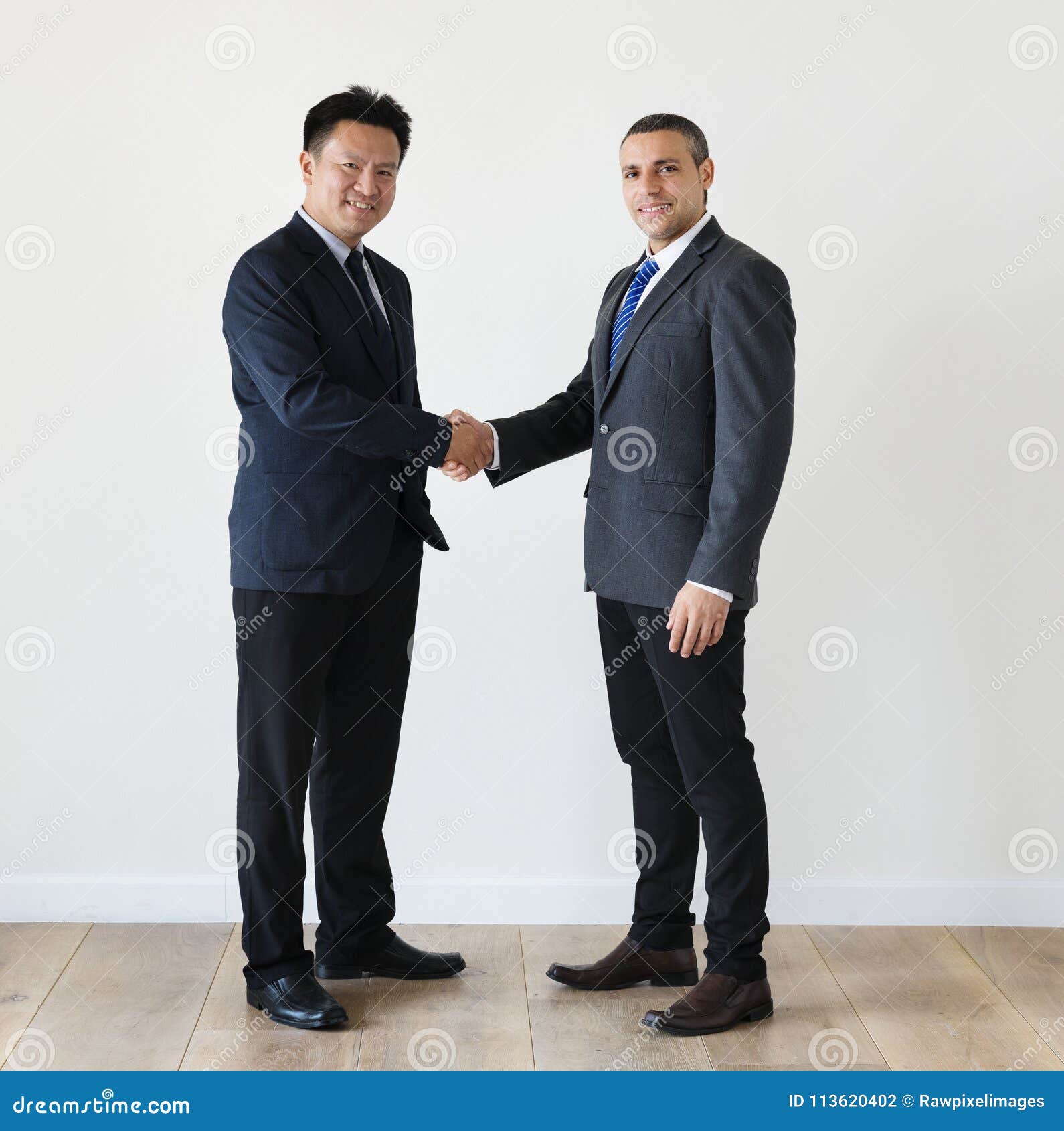 Diverse Businessmen Shaking Hands Together Stock Photo - Image of ...