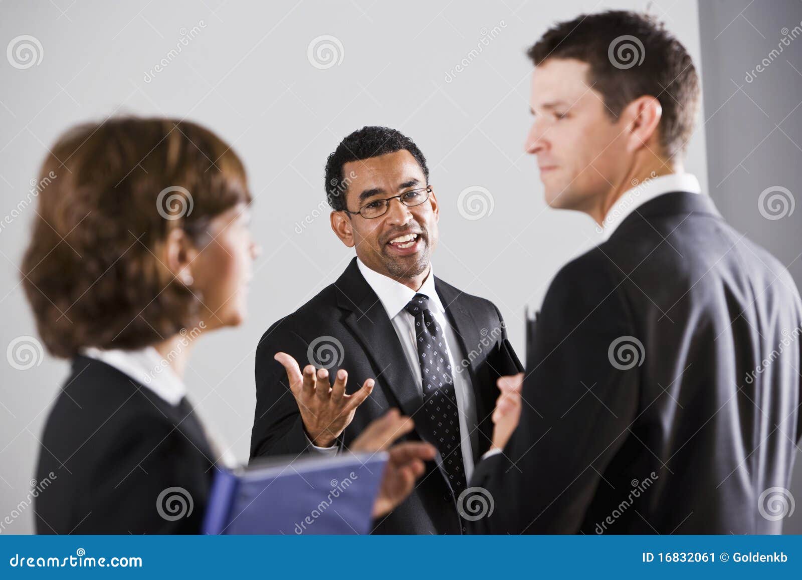 Diverse Businesspeople Conversing Stock Image - Image of multiracial ...