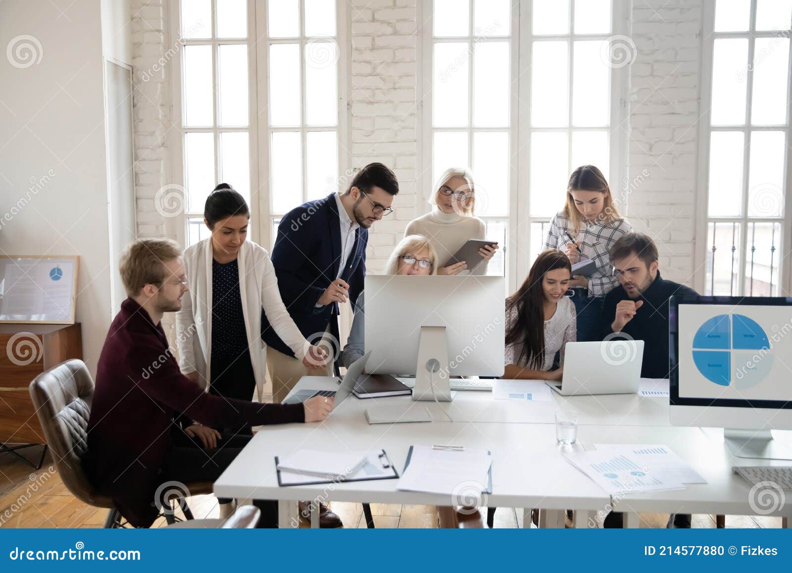 Diverse Businesspeople Work on Computers in Shared Office Stock Photo ...