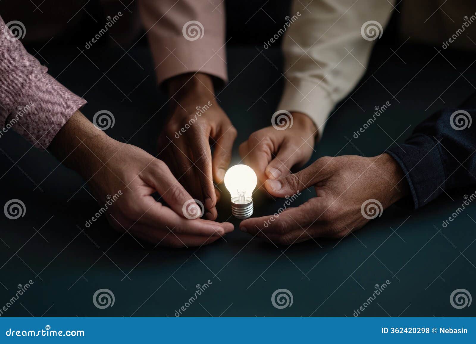 Diverse Collaboration: Hands Holding a Glowing Light Bulb As Symbol of ...