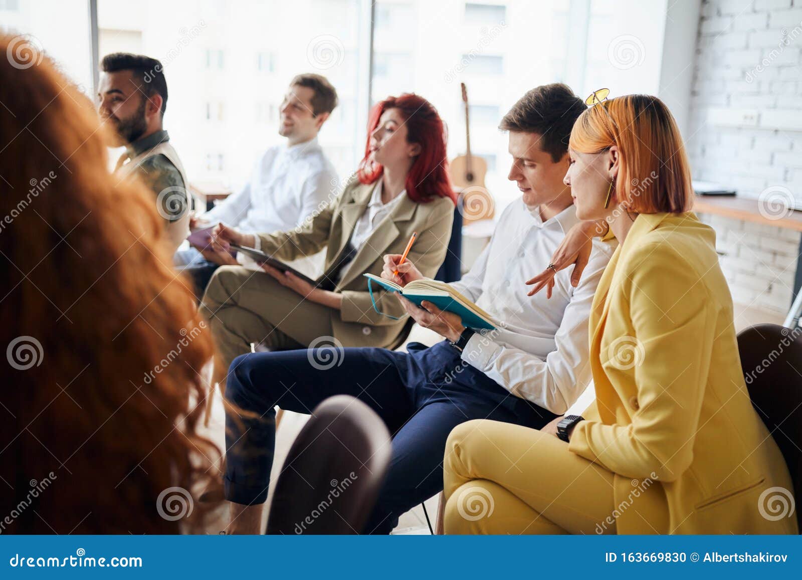 Diverse Colleagues Sit on Business Training with Coach Stock Photo ...