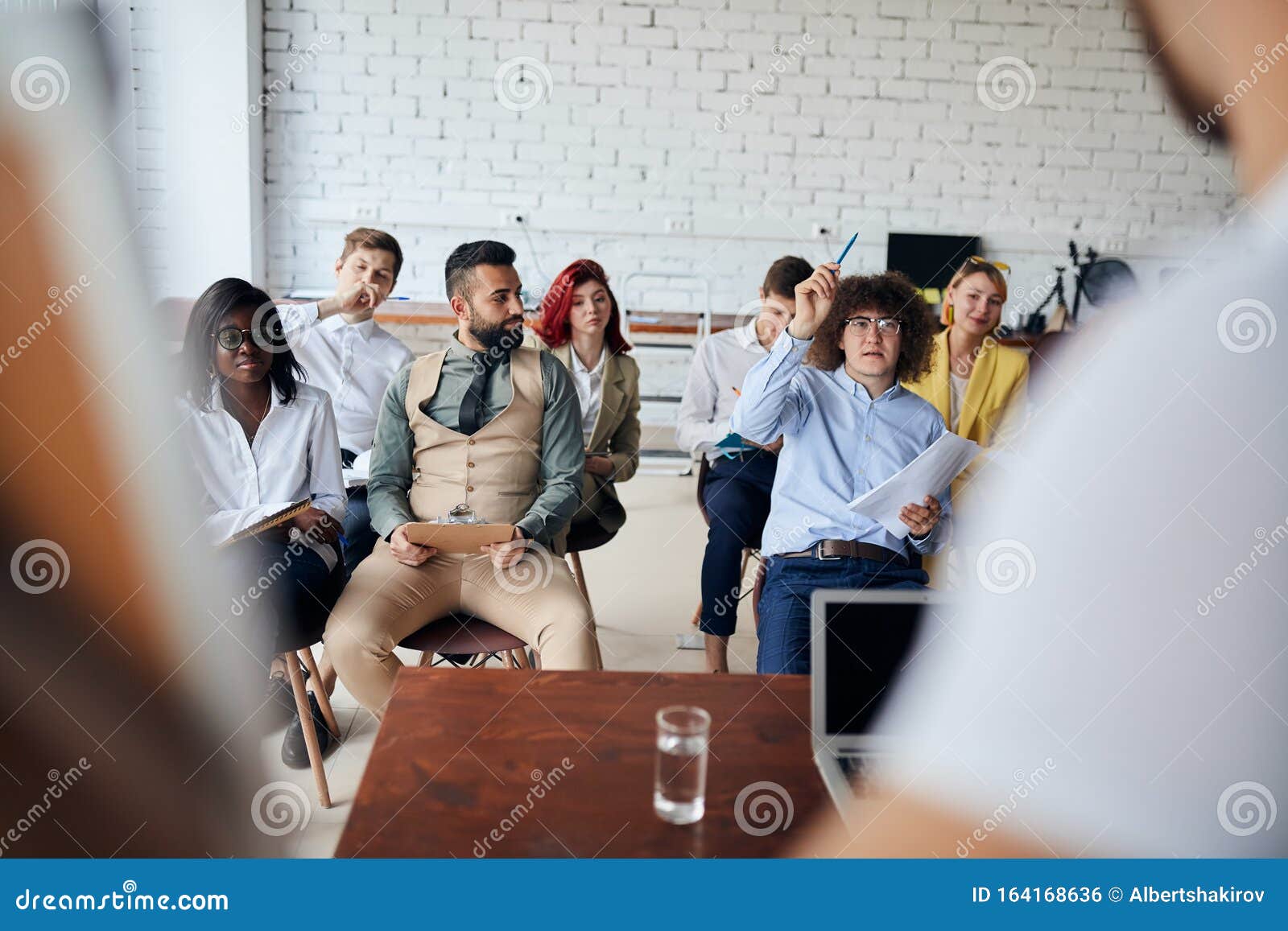 Diverse Colleagues Sit on Business Training with Coach Stock Photo ...