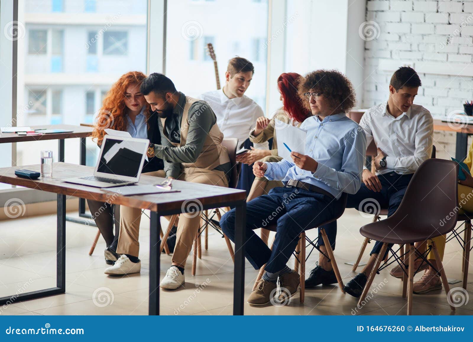 Diverse Colleagues Sit on Business Training with Coach Stock Photo ...