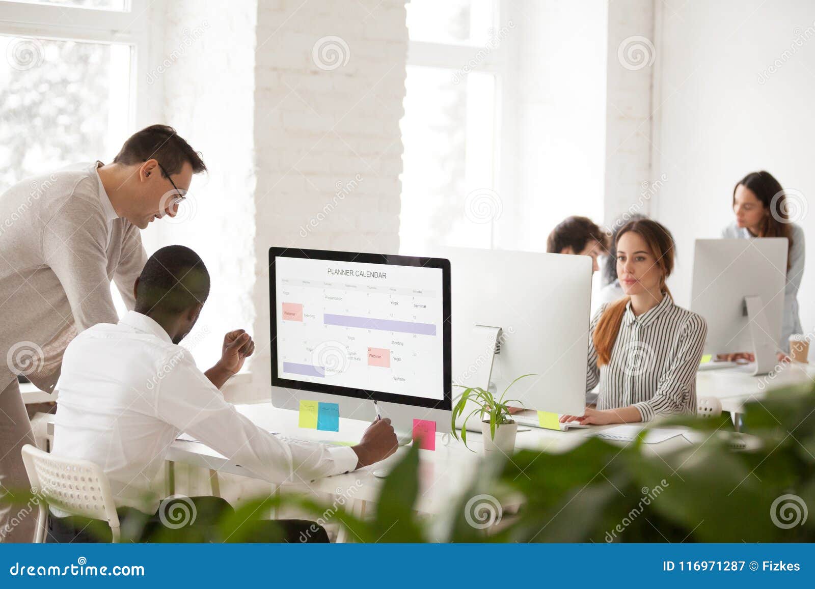 Diverse Colleagues Talking Planning Work Together in Multiracial Stock ...