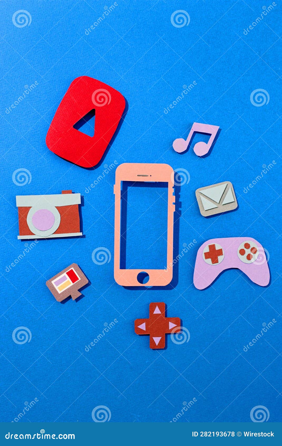 Diverse Collection of Paper Cut-outs of Electronic Items on a Vibrant ...