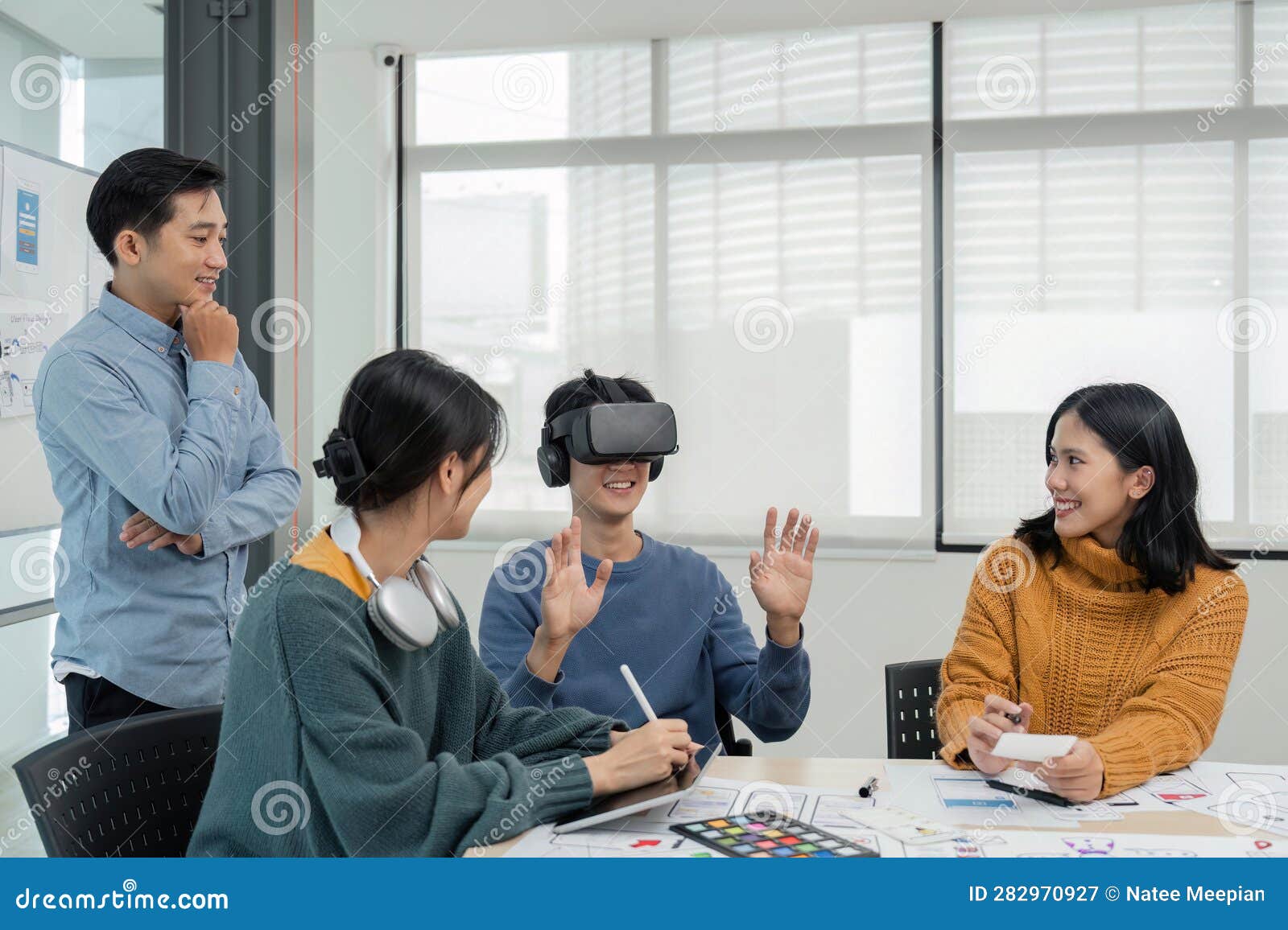Diverse Development Team Testing Virtual Reality Headset, Brainstorming ...