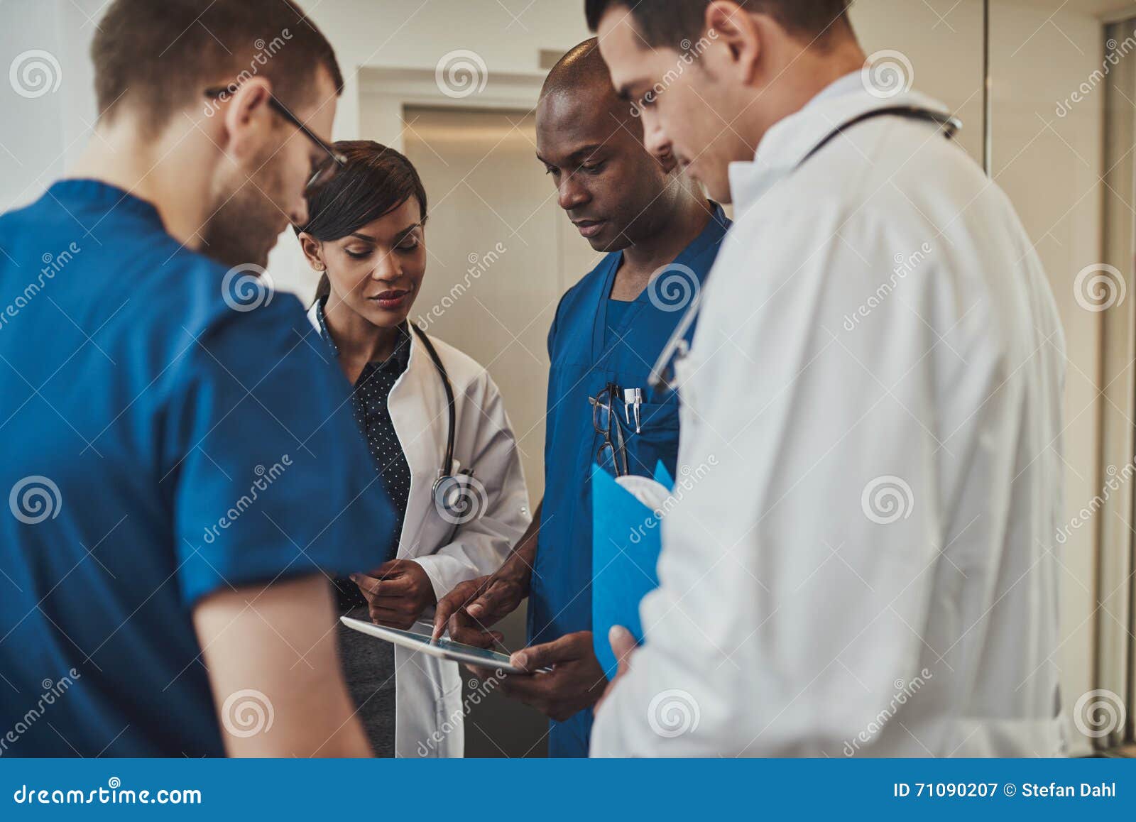 Diverse Doctors Having an Emergency Discussion Stock Image - Image of ...