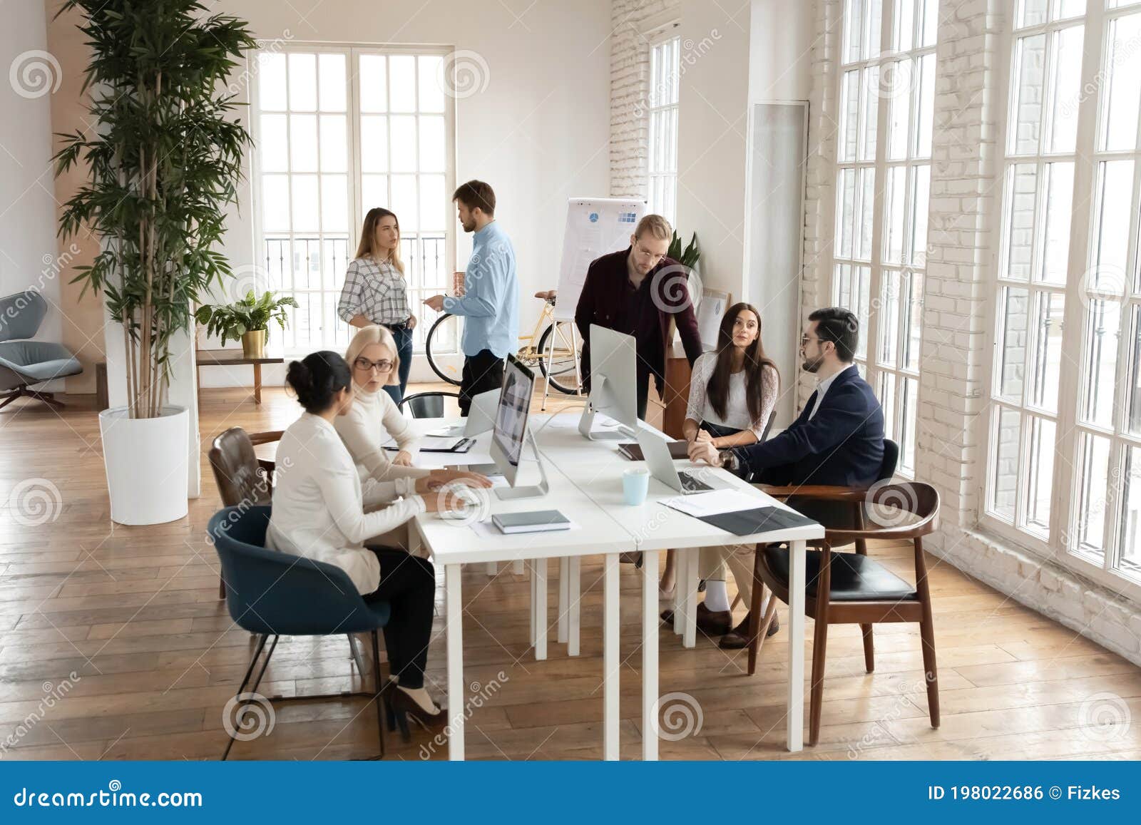 Diverse Employee Work Cooperate in Modern Office Together Stock Photo ...