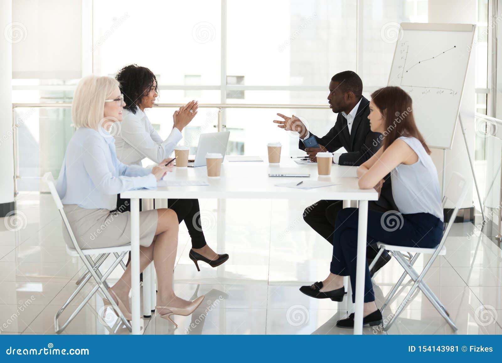 Diverse Employees Sit at Table, Discussing Project in Boardroom Stock ...