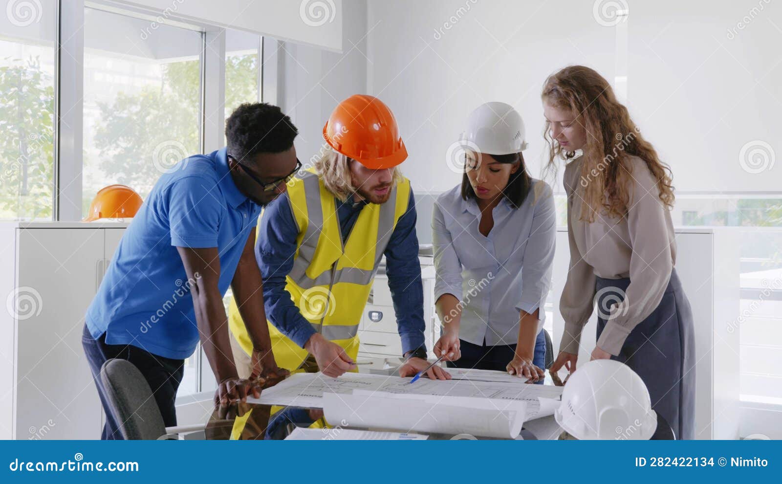 Diverse Engineering Team Meeting To Discuss Architectural Project and ...