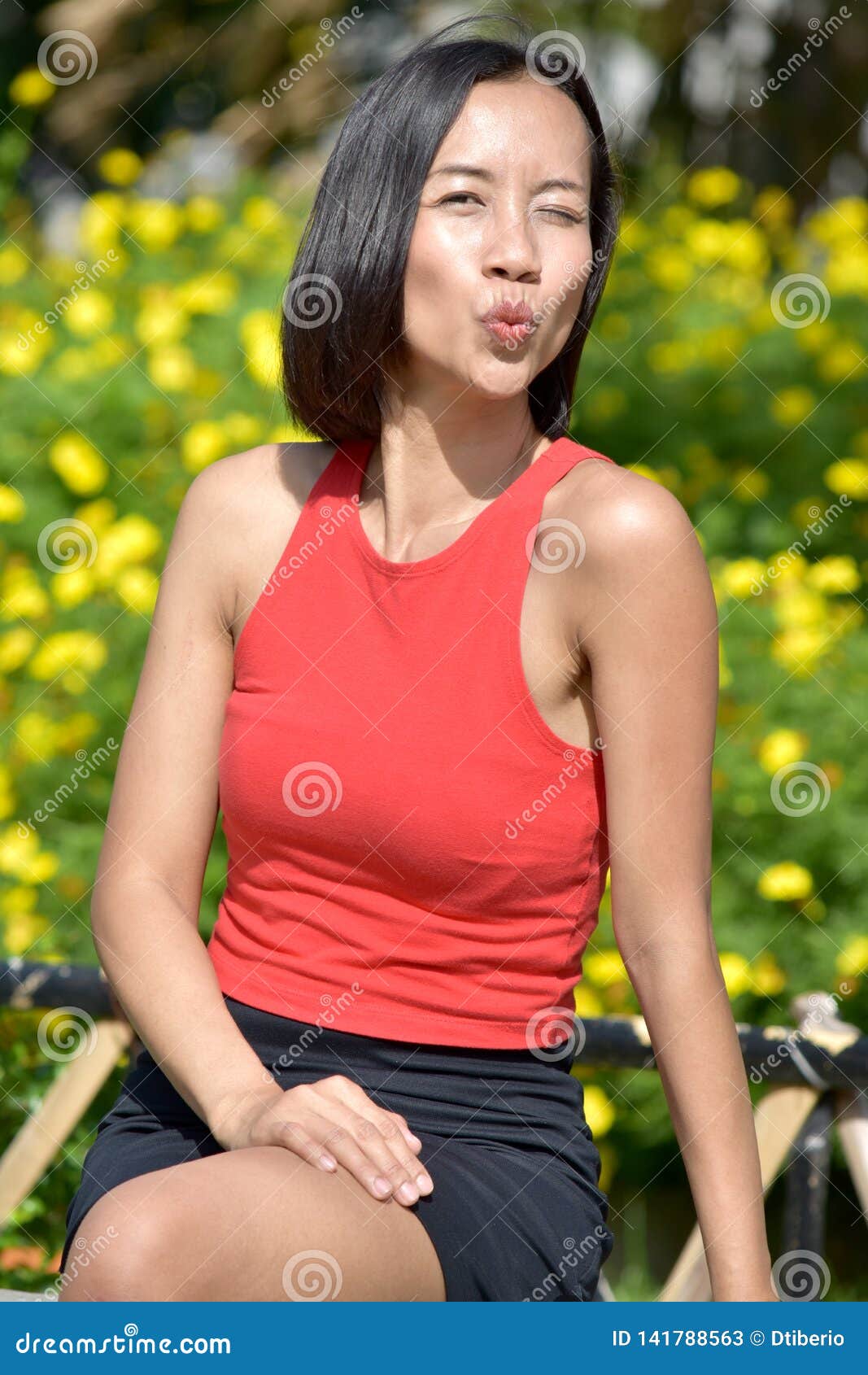 A Diverse Female Winking stock image. Image of female - 141788563