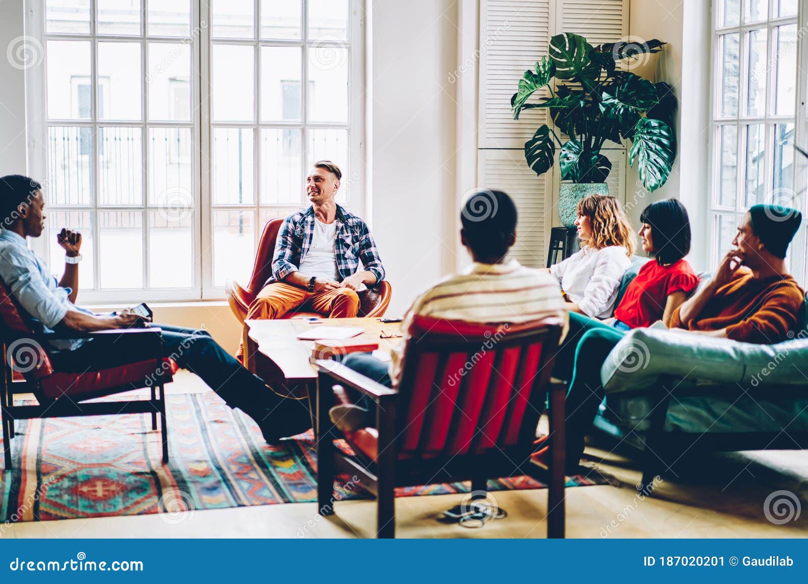 Diverse Friends Gathering in Spacious Living Room Stock Image - Image ... Diverse Friends Gathering in Spacious Living Room Stock Image - Image ...