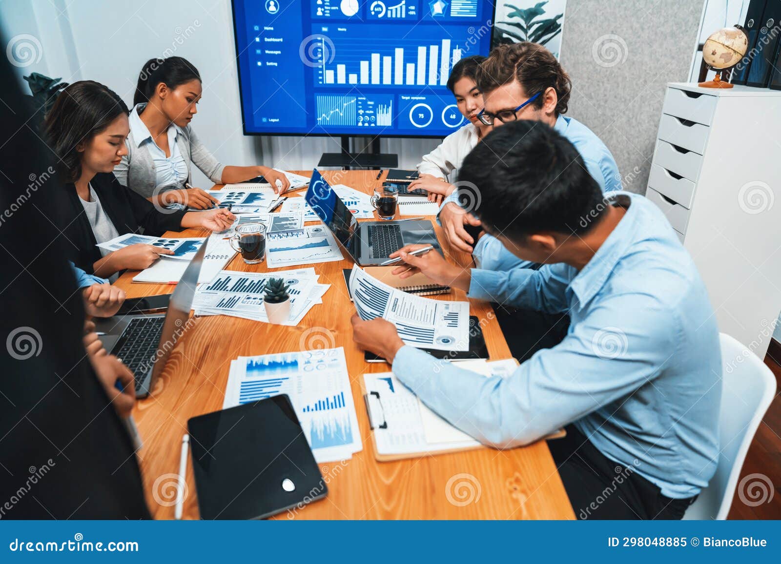 Group of Business Analyst Team Analyzing Financial Data Report ...