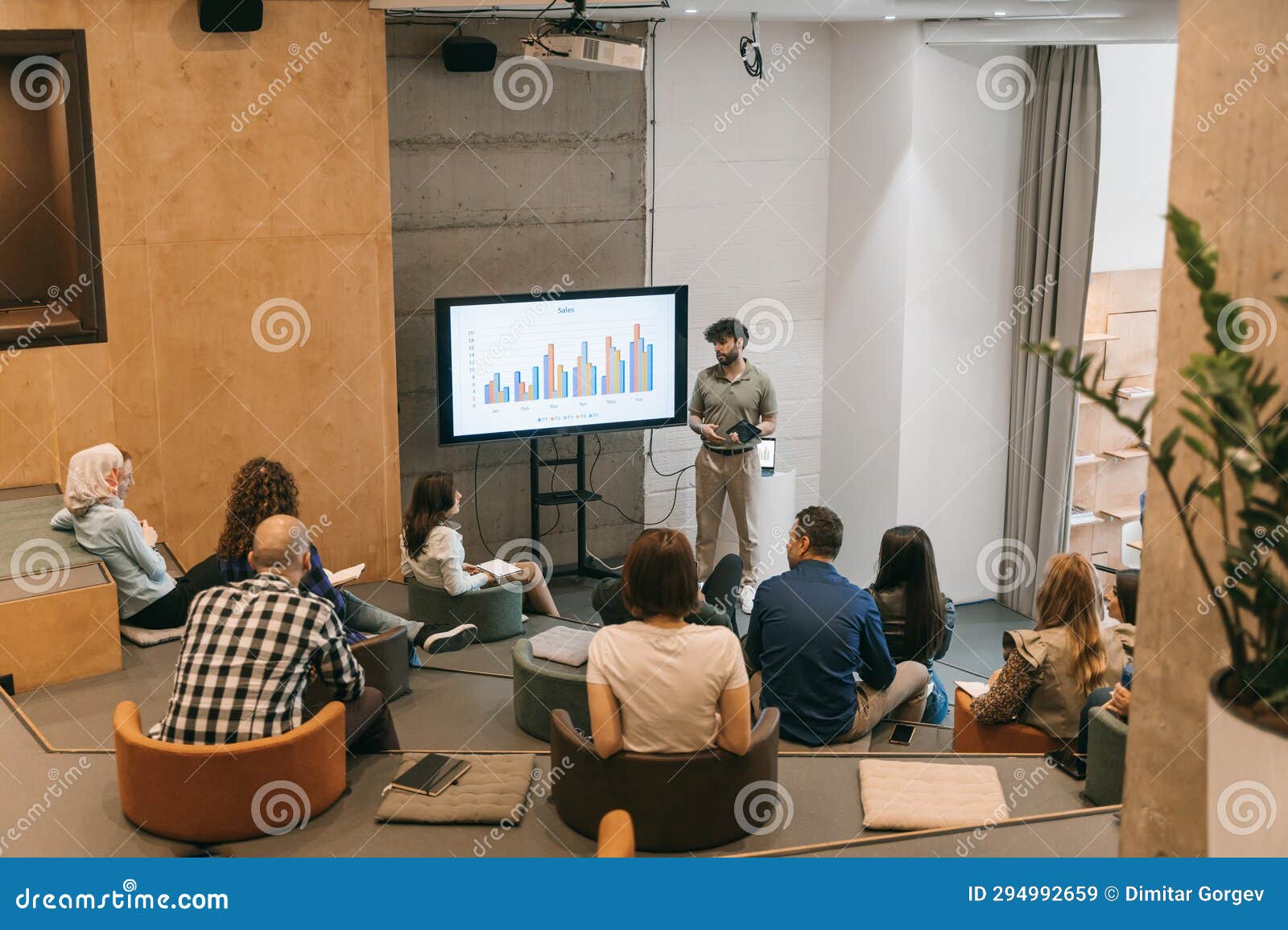 Diverse Group of Businesspeople Having a Presentation at Modern Co ...