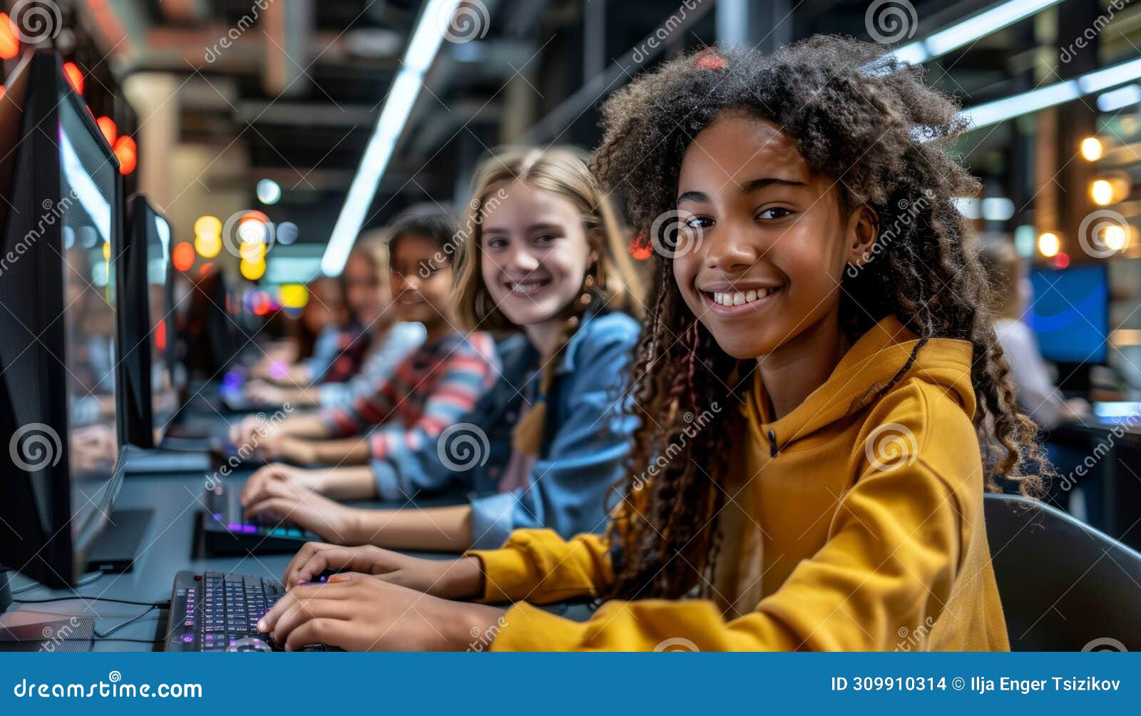 Diverse Group Of Children Engaged In Computer Learning Session At ...