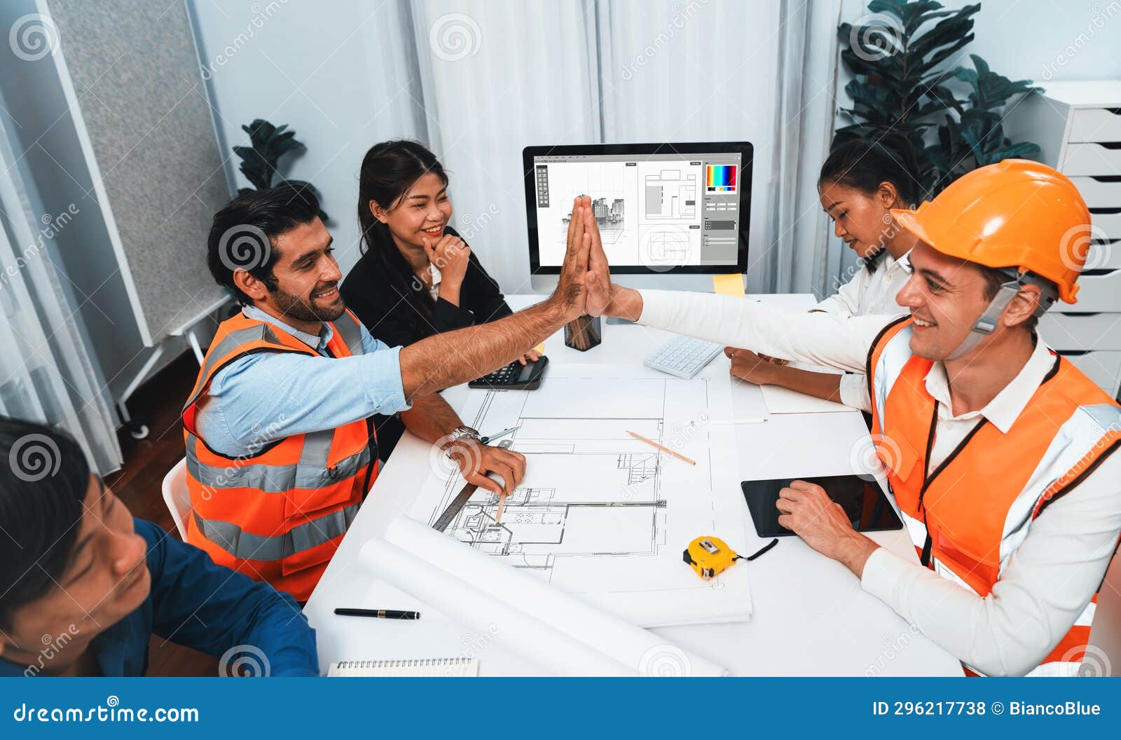 Diverse Group of Civil Engineer and Client Celebrate and High Five ...