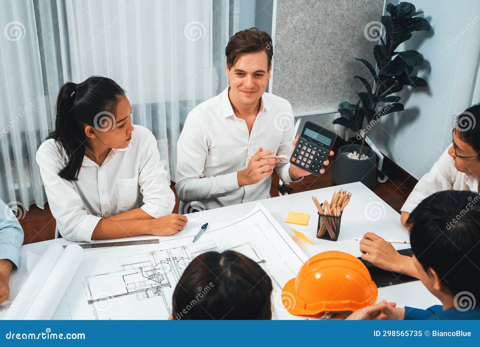 Diverse Group of Civil Engineer and Client Working on Architect ...