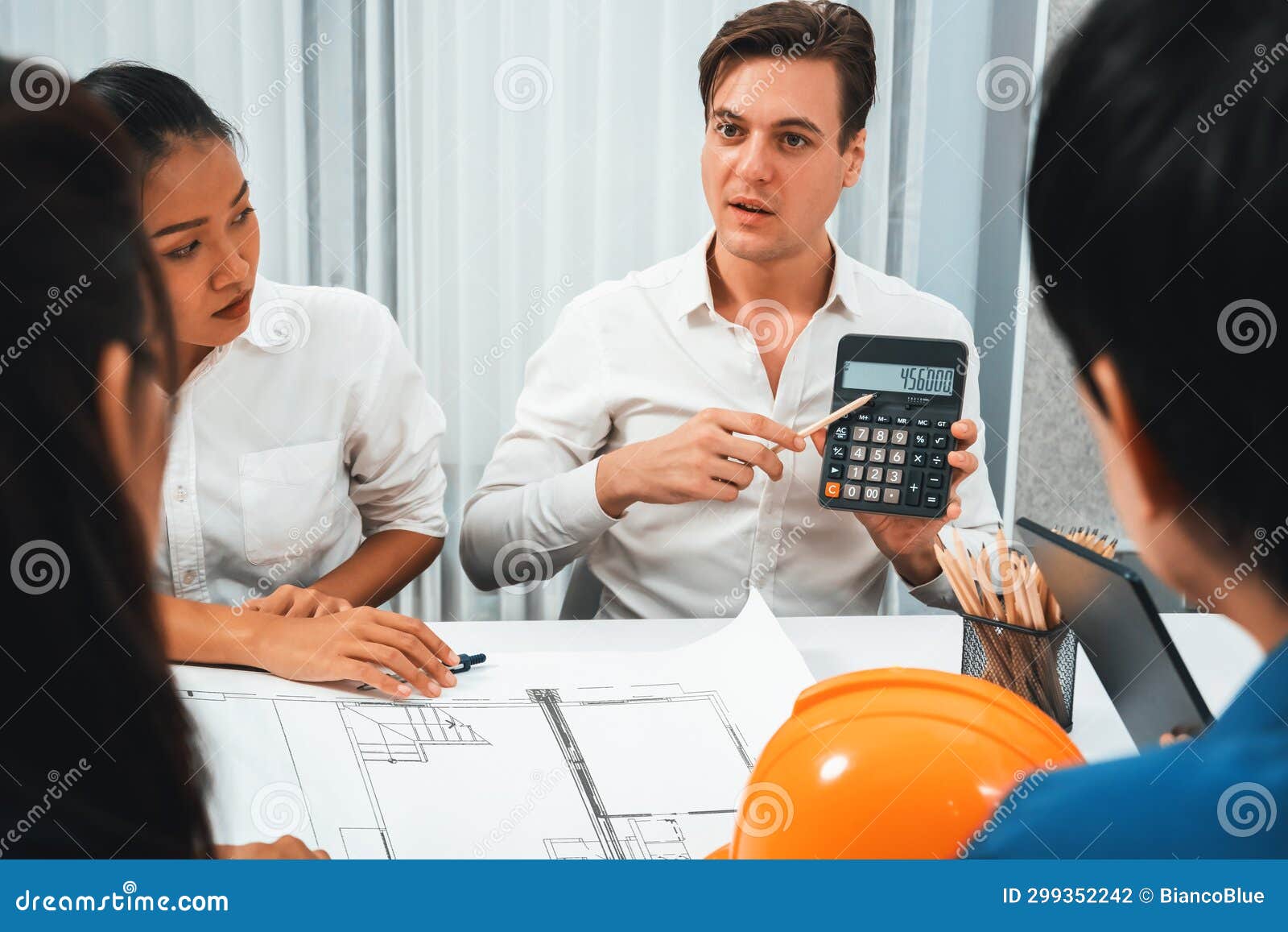 Diverse Group of Civil Engineer and Client Working on Architect ...