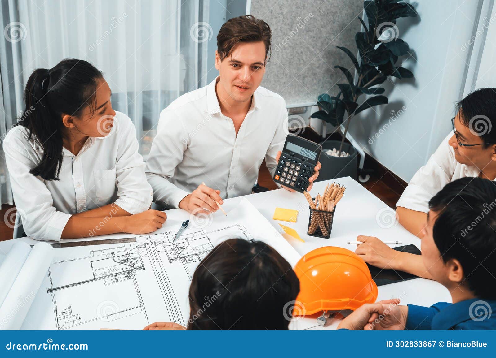 Diverse Group of Civil Engineer and Client Working on Architect ...