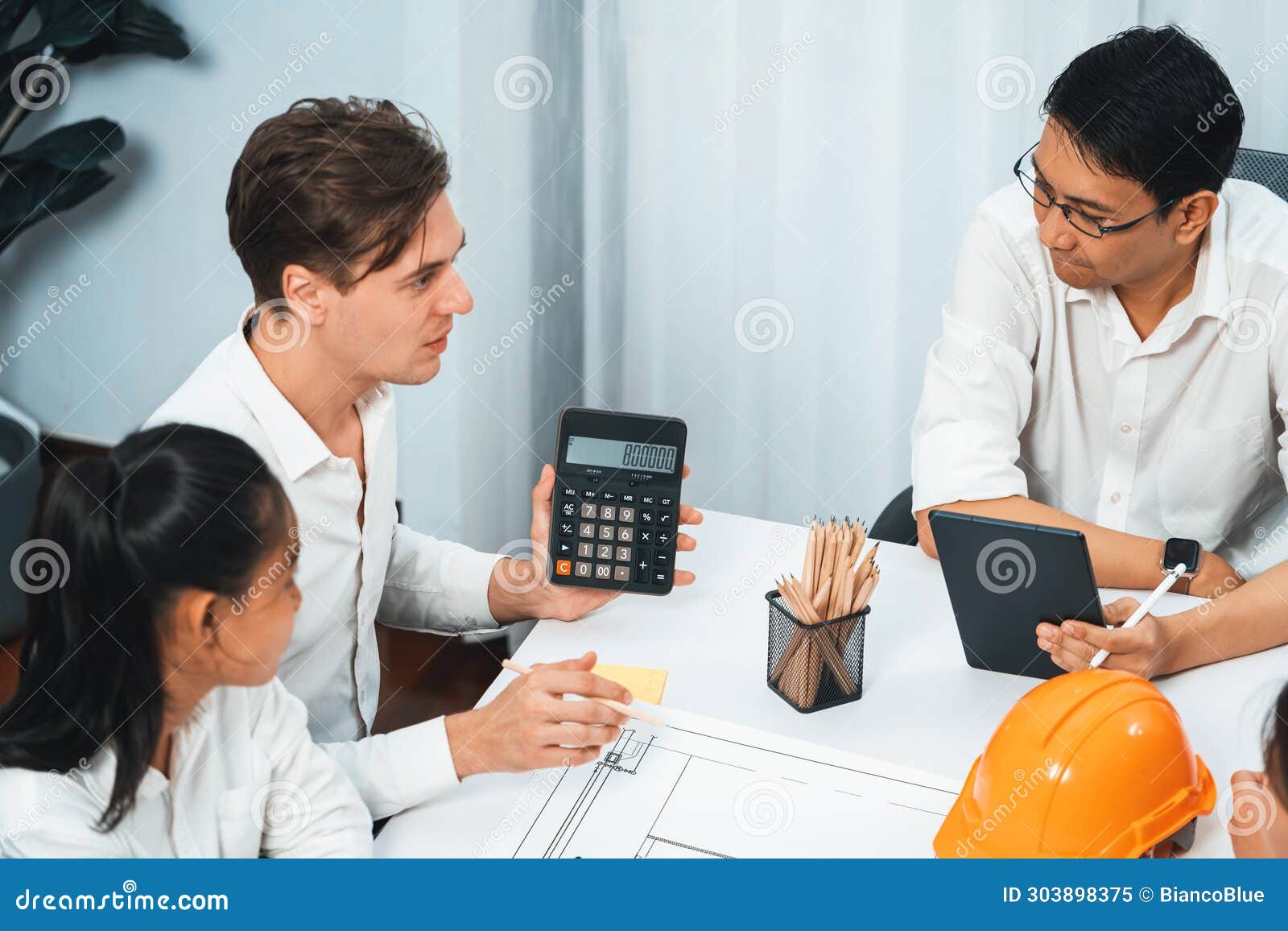 Diverse Group of Civil Engineer and Client Working on Architect ...