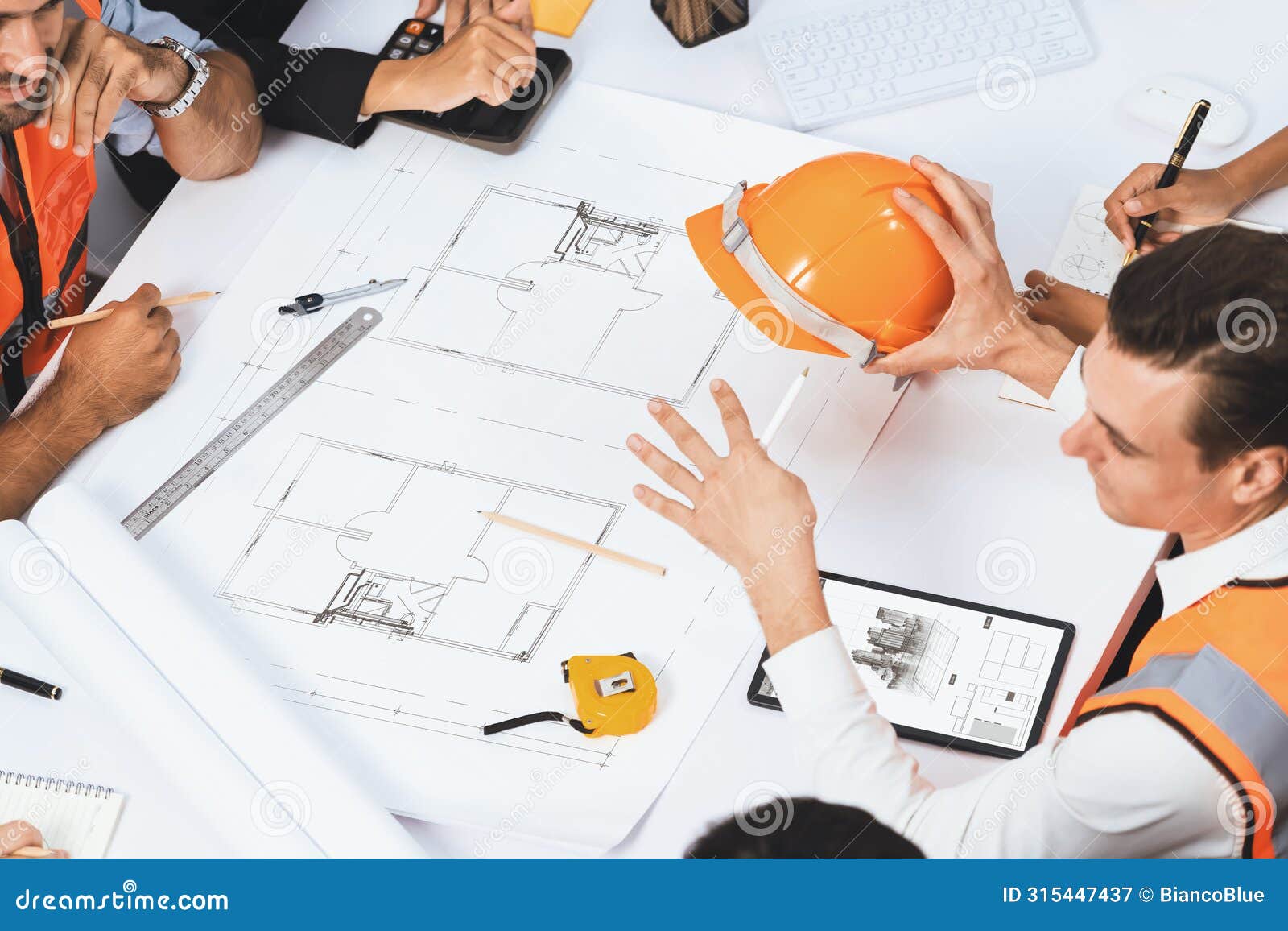 Diverse Group of Civil Engineer and Client Working on Architect ...