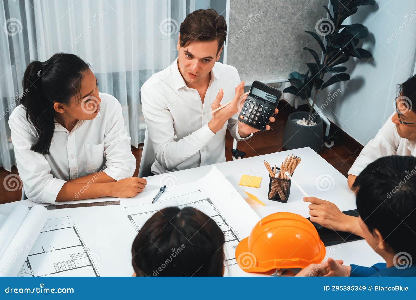 Diverse Group of Civil Engineer and Client Working on Architect ...