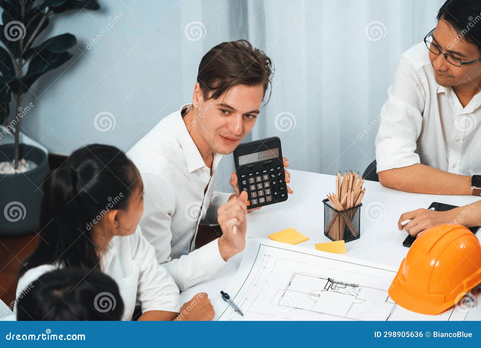 Diverse Group of Civil Engineer and Client Working on Architect ...