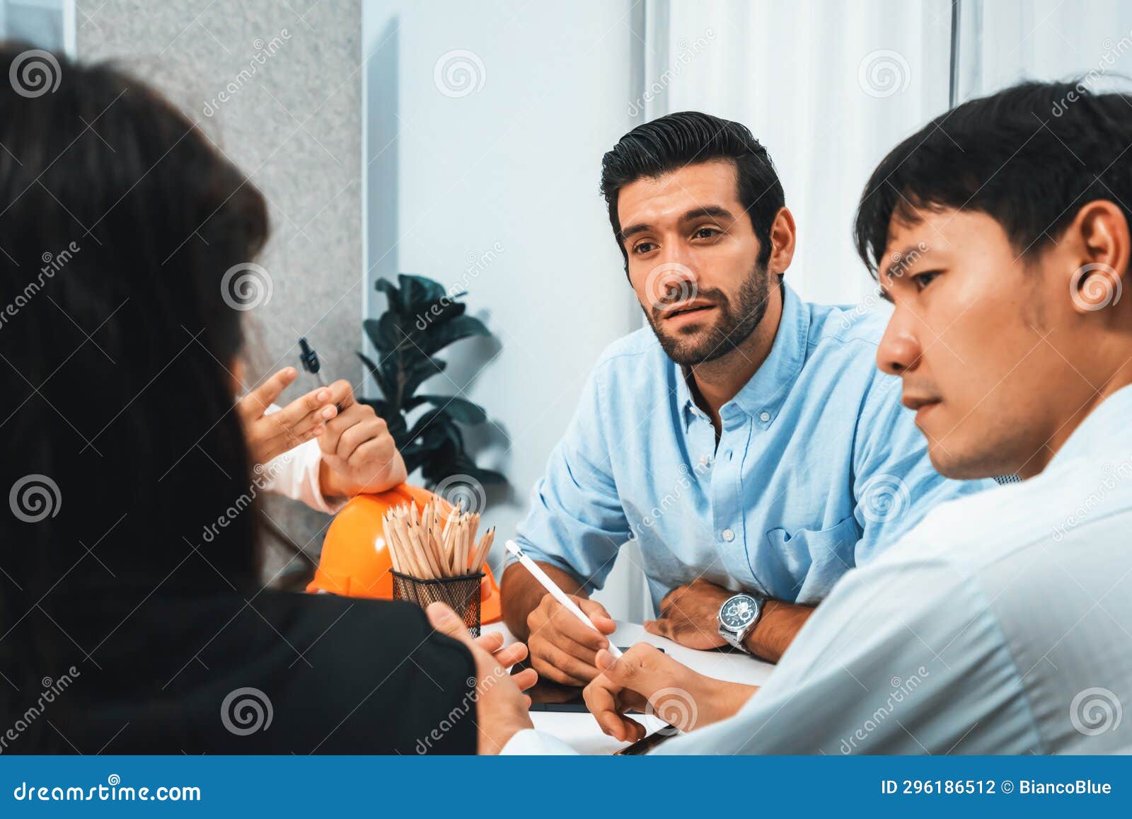 Diverse Group of Civil Engineer and Client Working on Architect ...