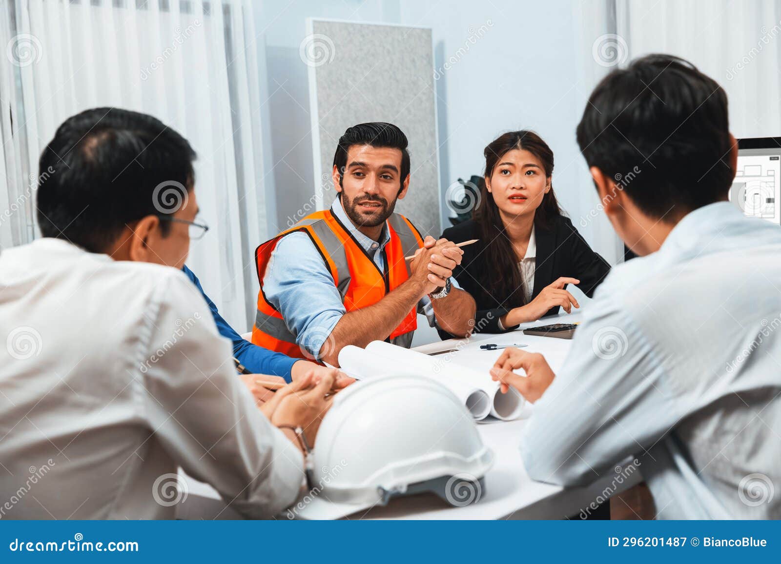 Diverse Group of Civil Engineer and Client Working on Architect ...