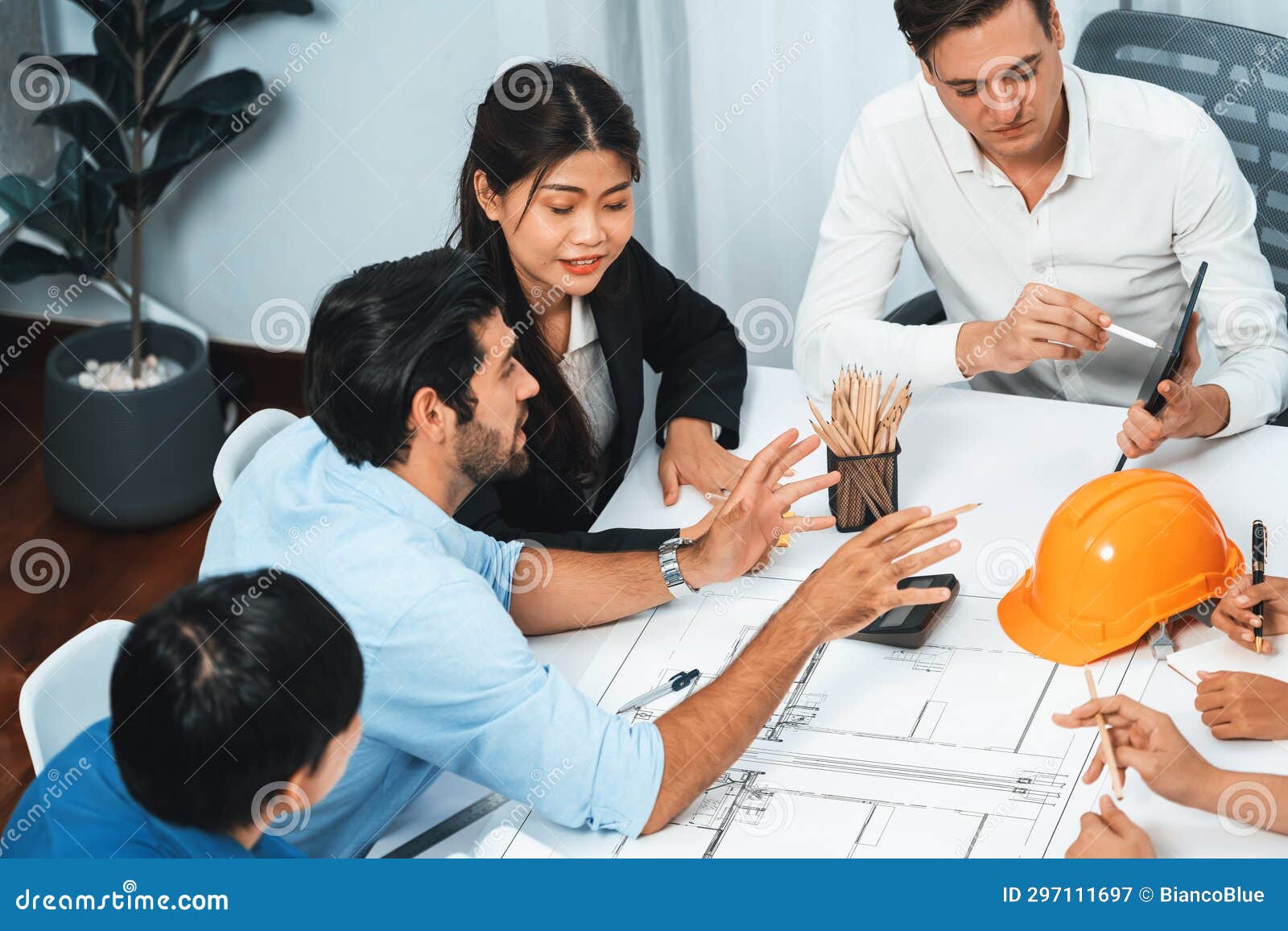 Diverse Group of Civil Engineer and Client Working on Architect ...