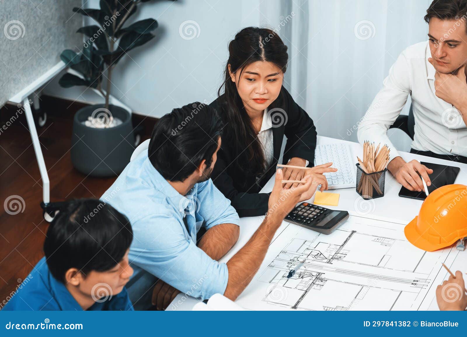 Diverse Group of Civil Engineer and Client Working on Architect ...