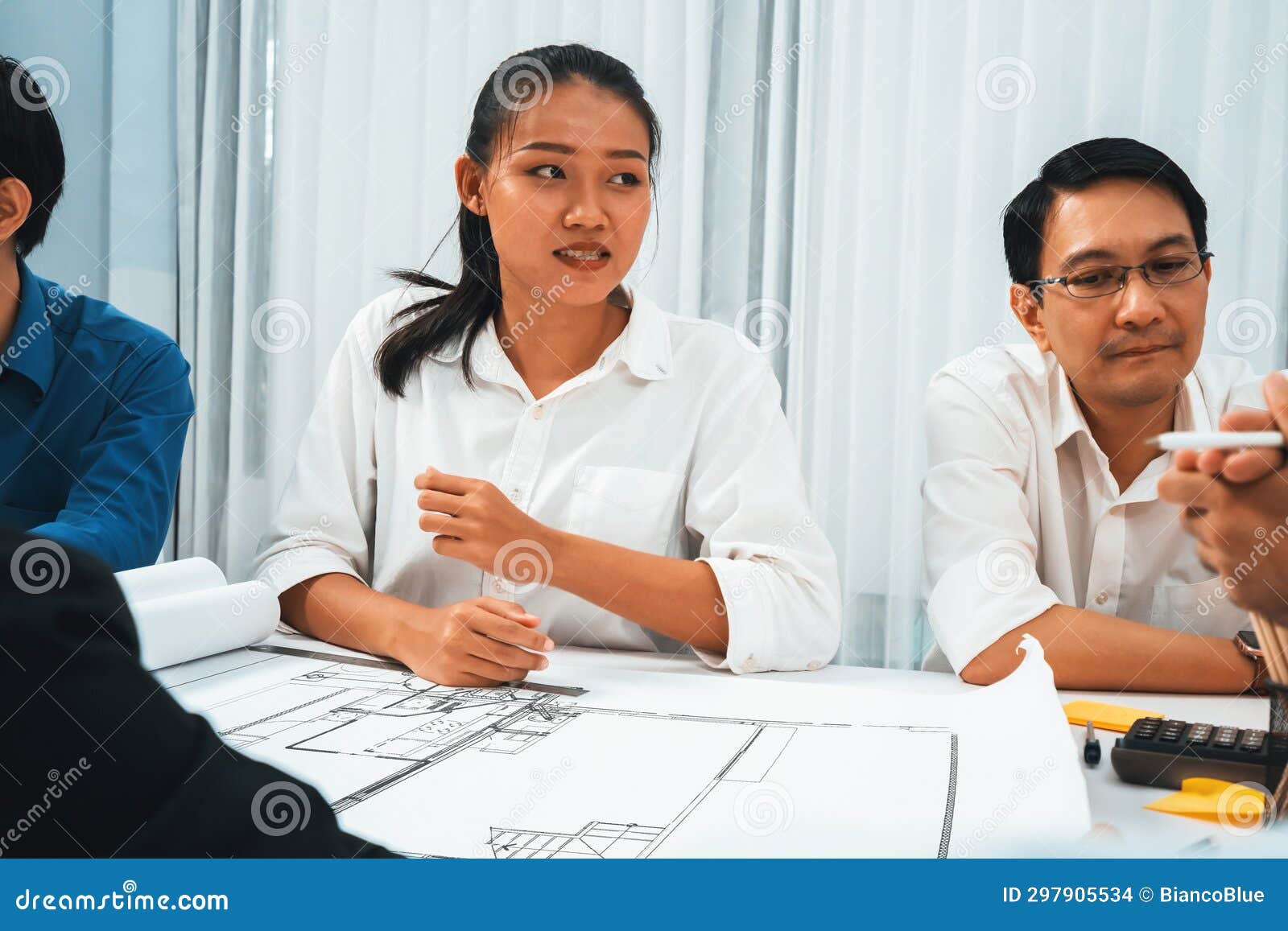 Diverse Group of Civil Engineer and Client Working on Architect ...