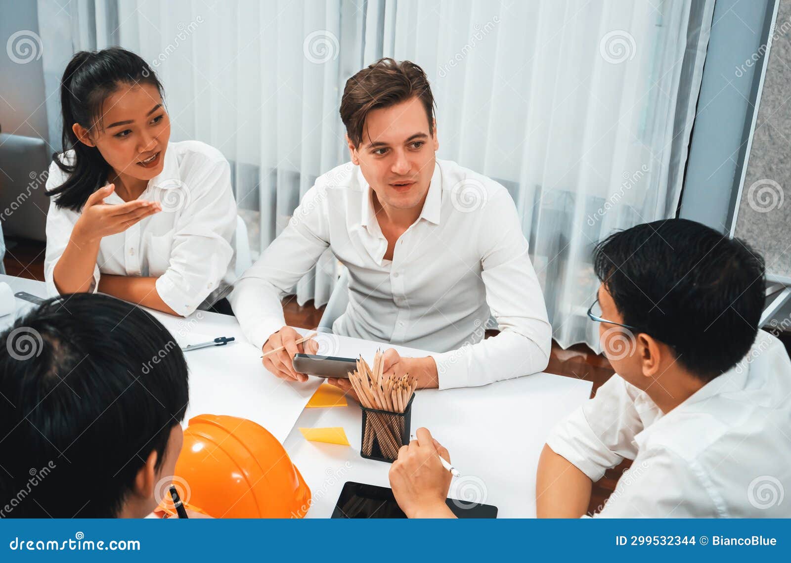 Diverse Group of Civil Engineer and Client Working on Architect ...