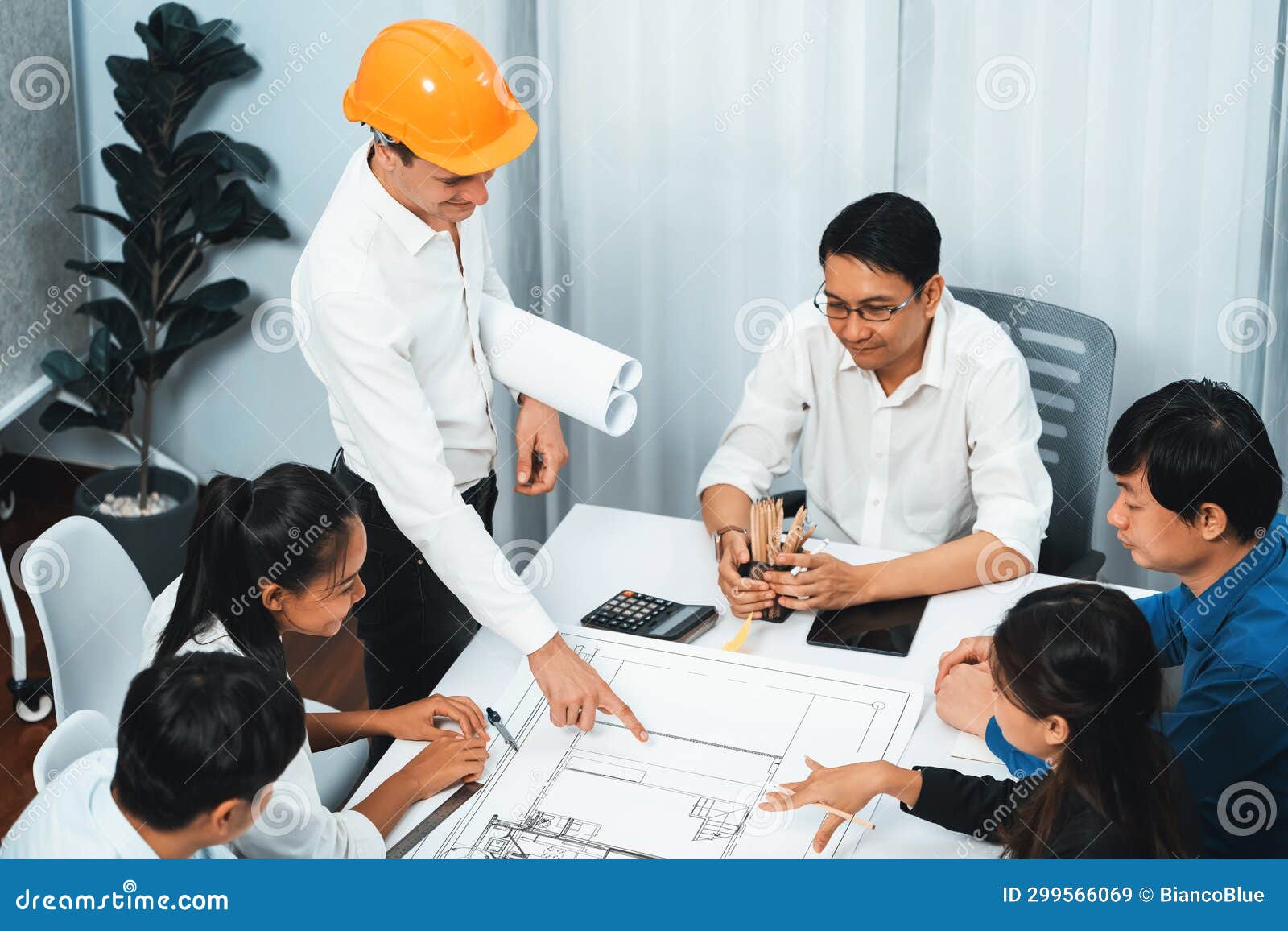 Diverse Group of Civil Engineer and Client Working on Architect ...