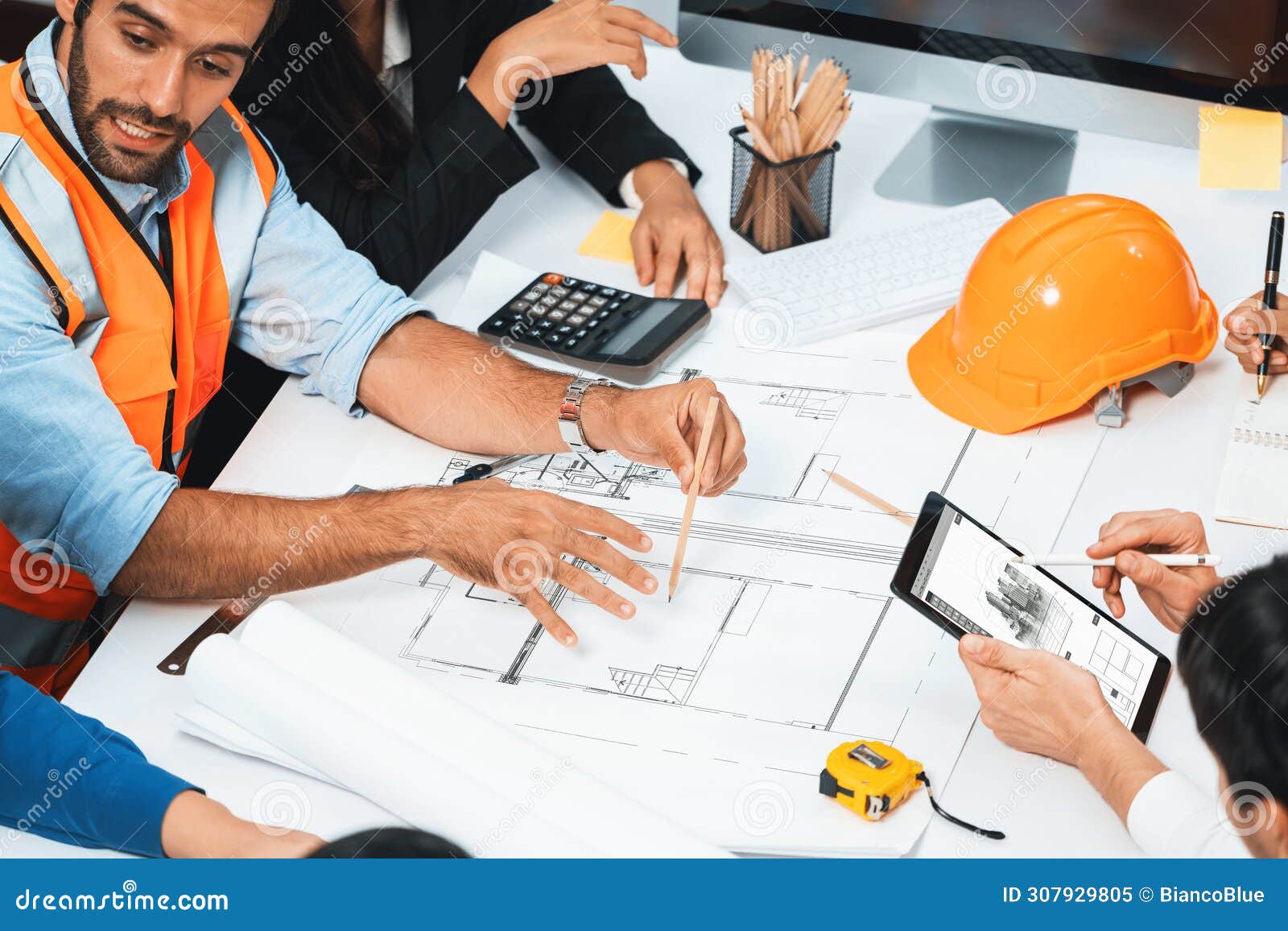 Diverse Group of Civil Engineer and Client Working on Architect ...